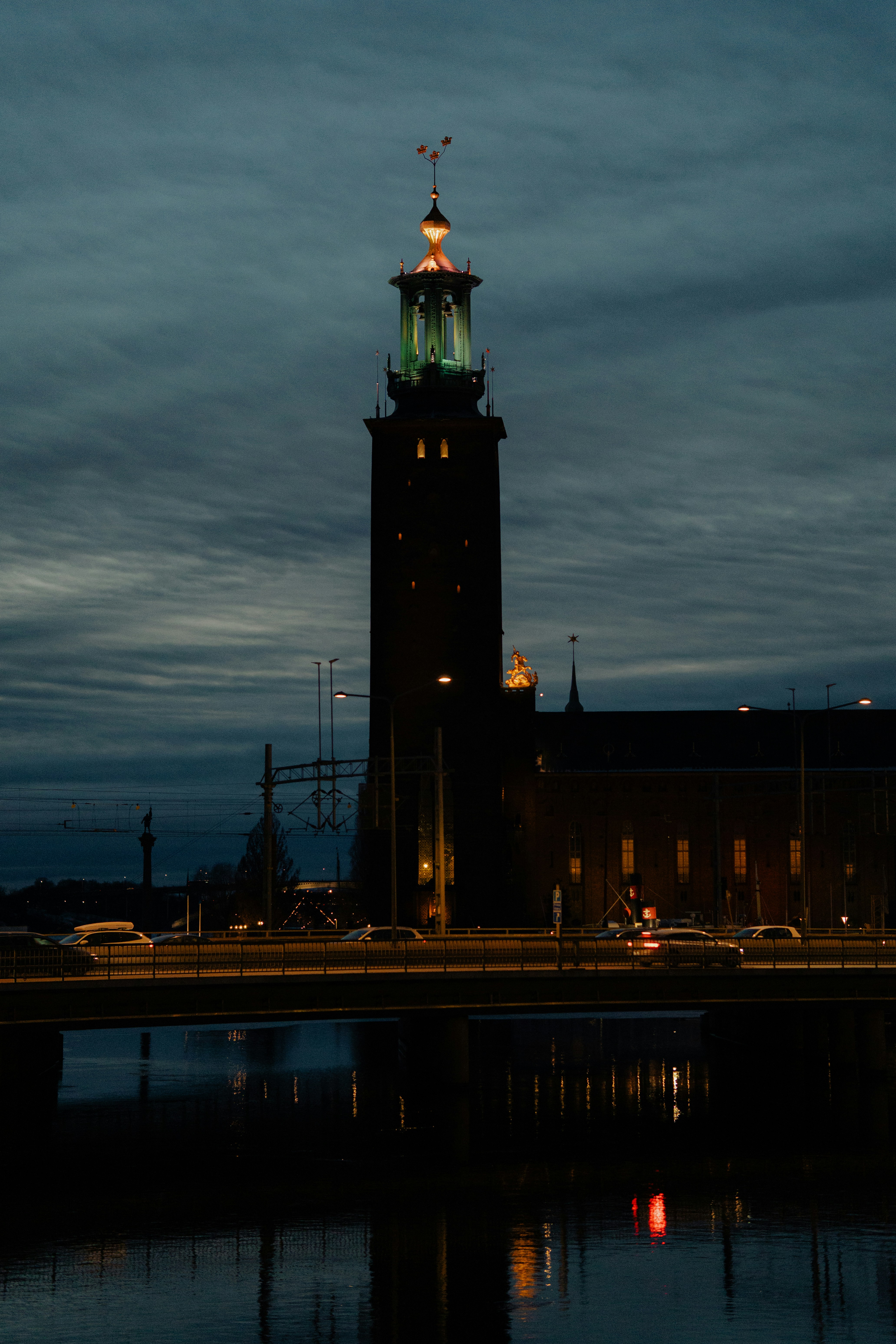 Lighthouse at Dusk: A Silent Sentinel Over the River