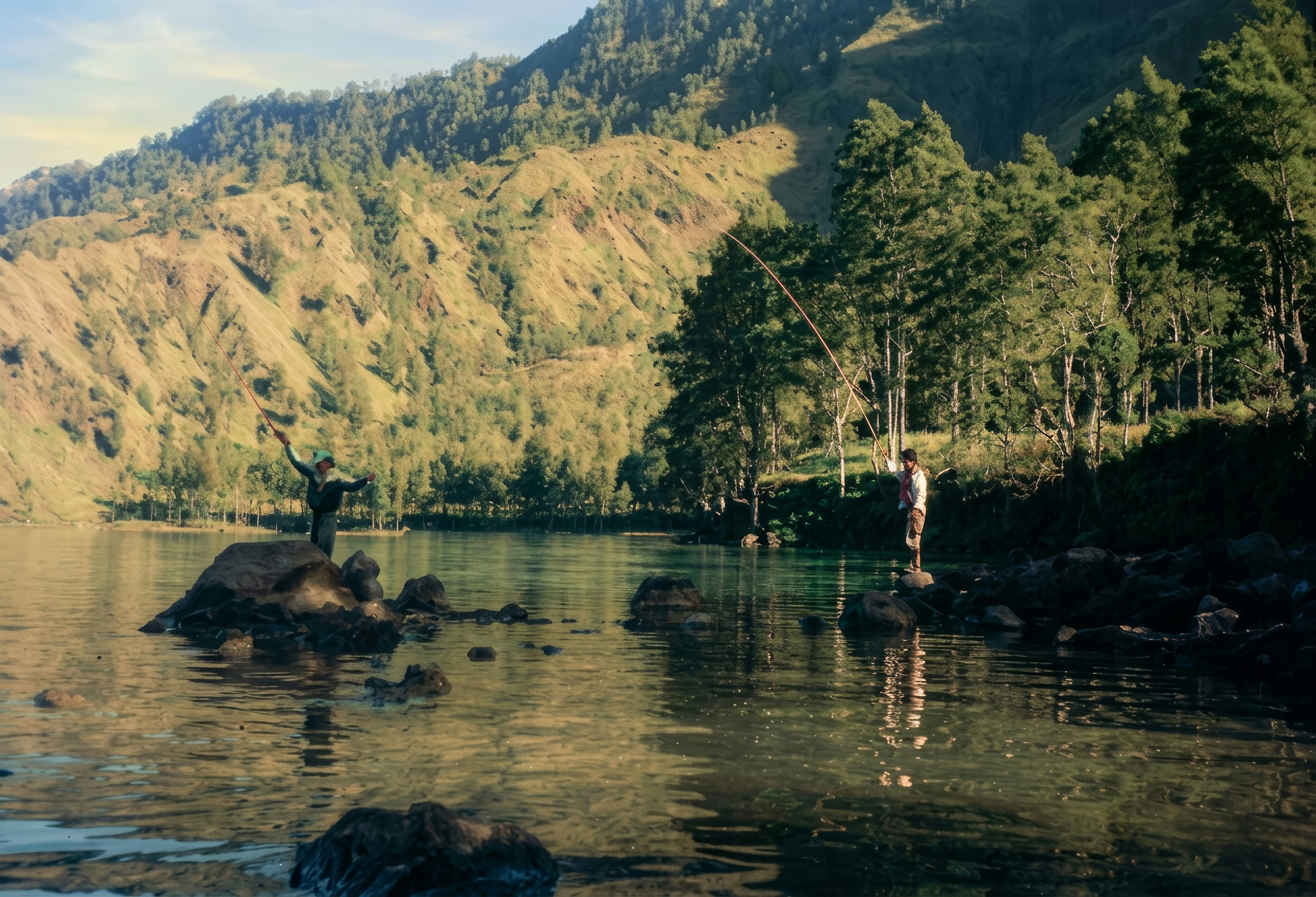 A Local hikers going fishing in the lake Segara Anak, Mount Rinjani, West Nusa Tenggara, Lombok-Indonesia. Circa 1994.