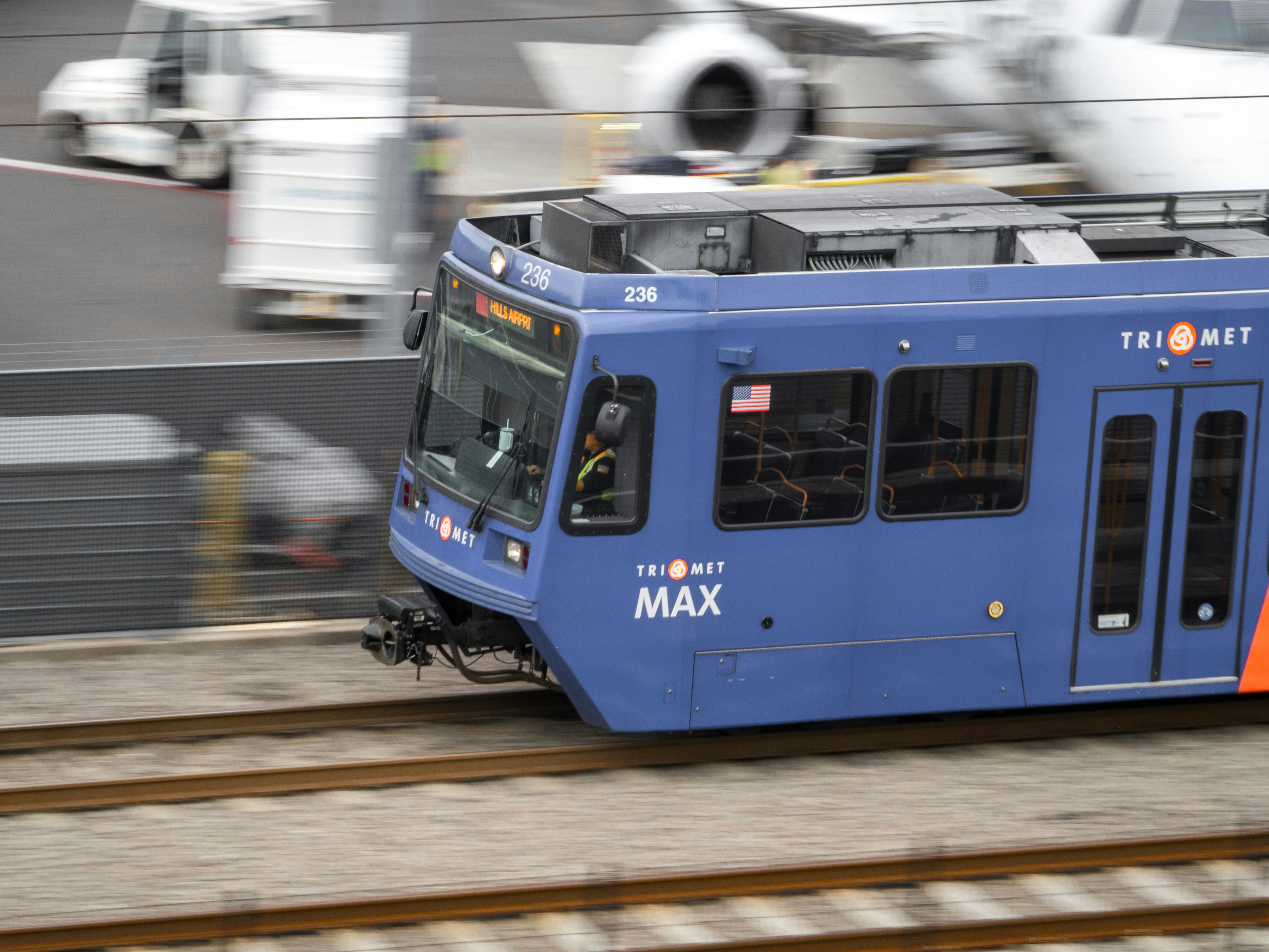 Blue MAX Tram in Motion at the Station Yard
