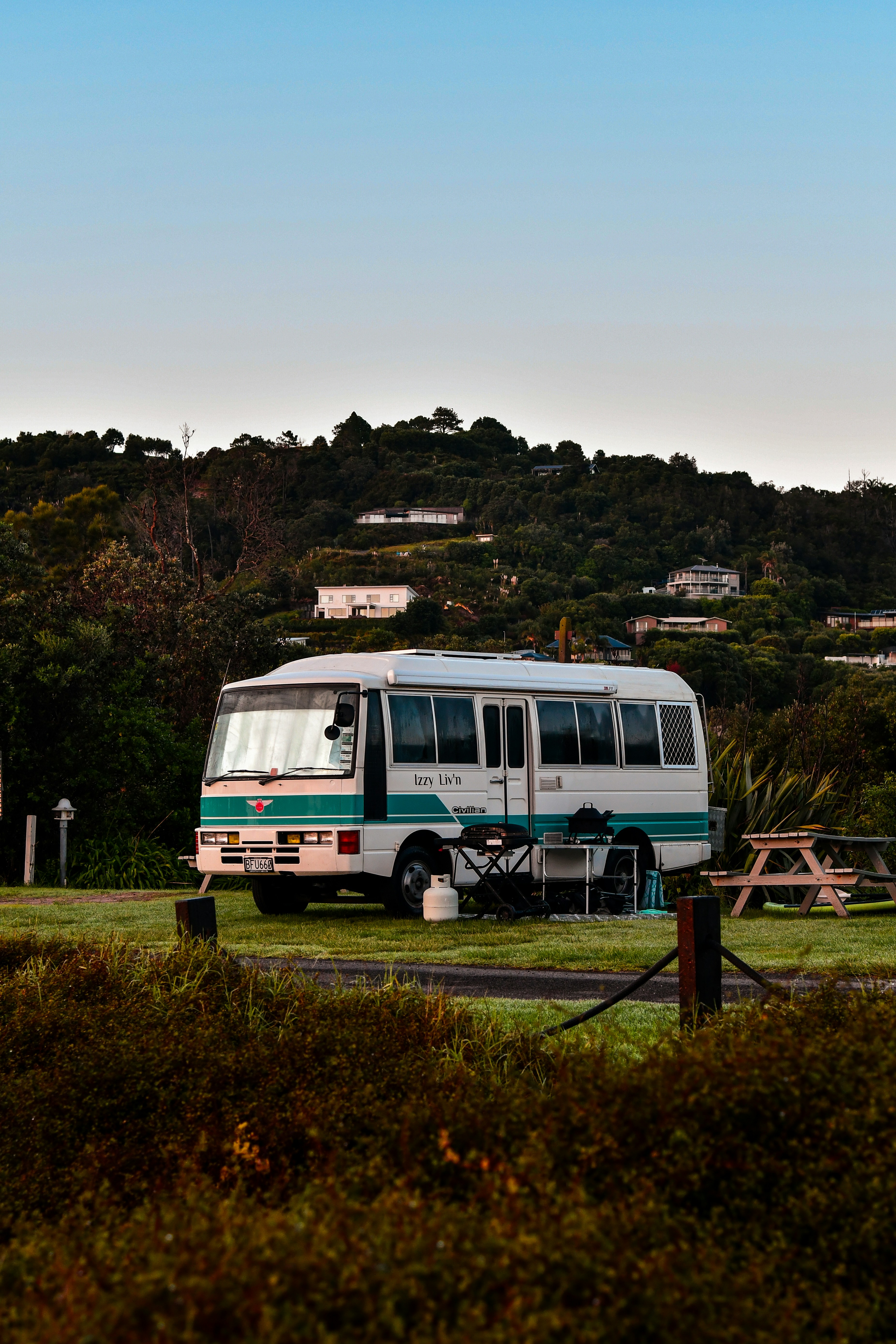Tiny RV Oasis under a Hillside Sky