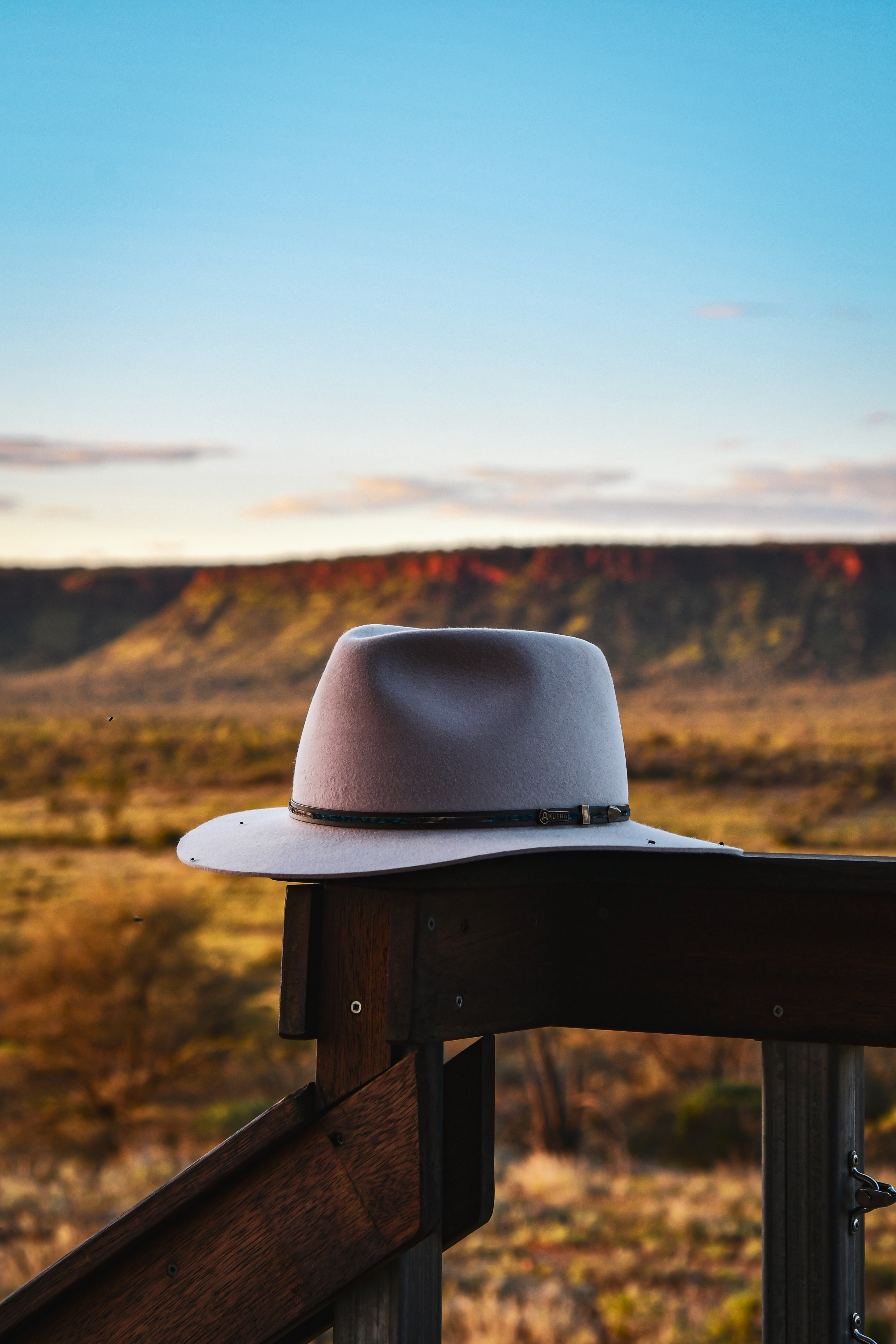 Widow’s Peak: A Cowboy Hat Brimming with Sunset Quiet