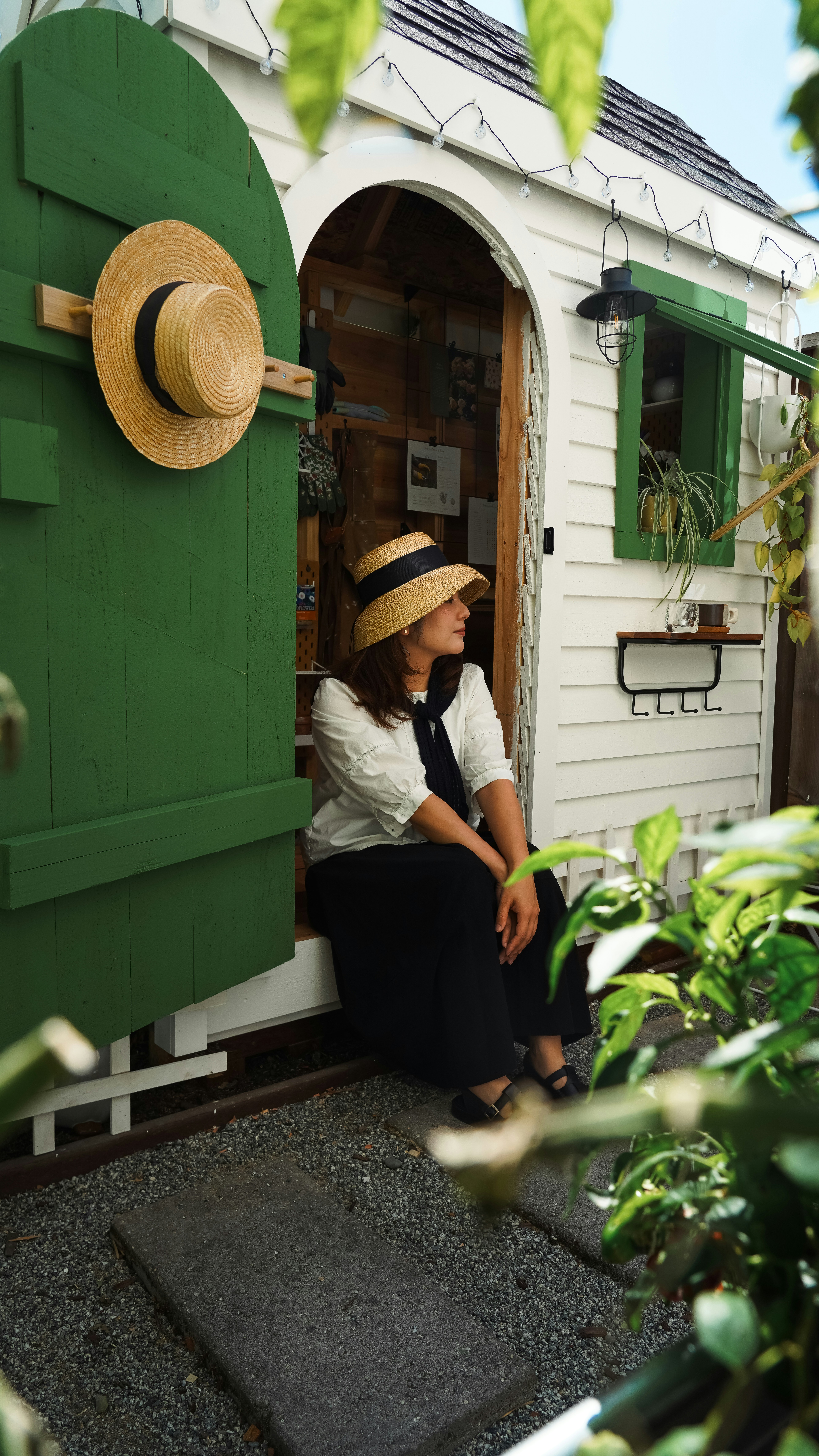 Green-arched Welcome: A Quiet Moment on a Cottage Doorstep