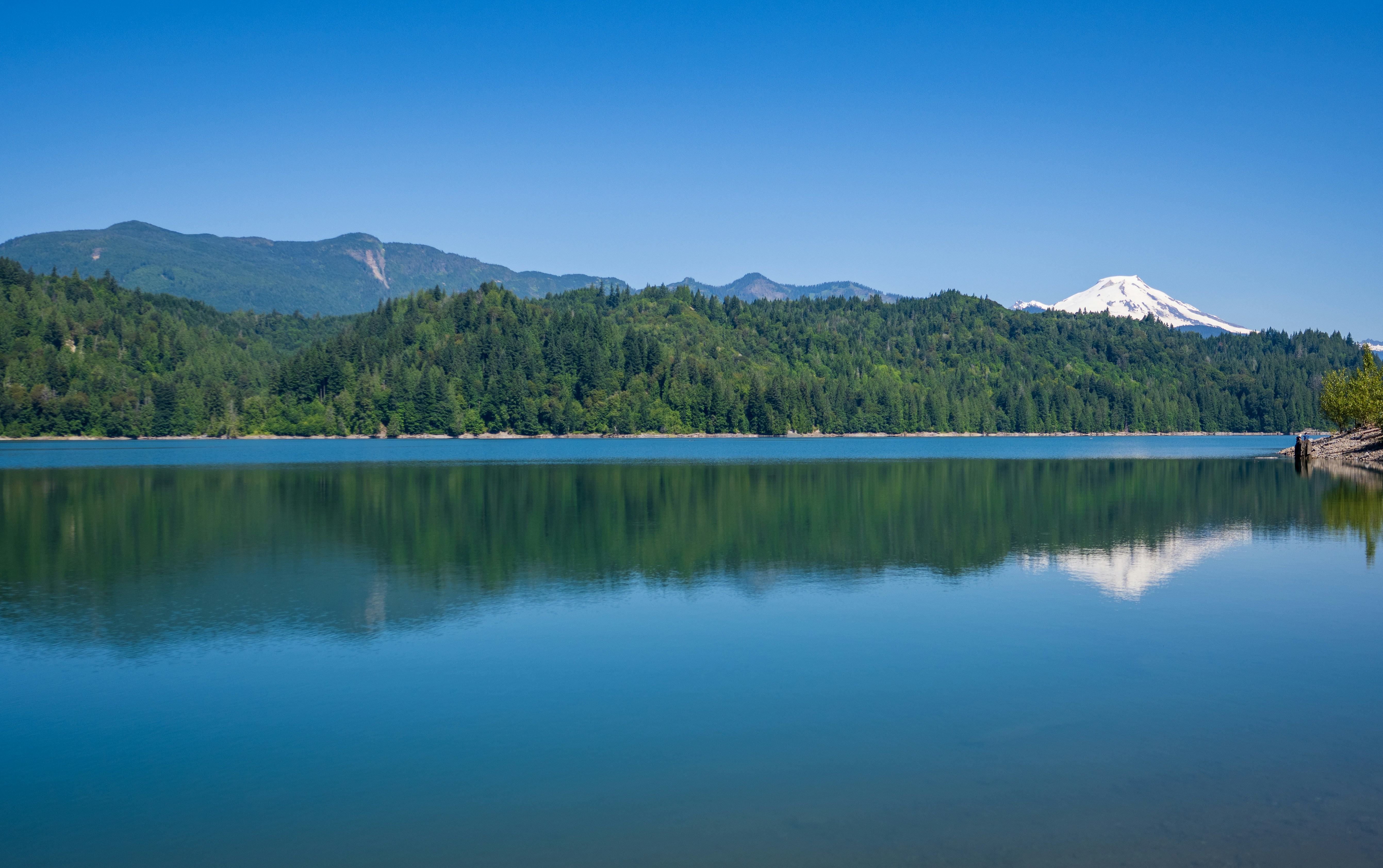 Snow Peak on the Horizon: A Quiet Lake Under a Velvet Sky