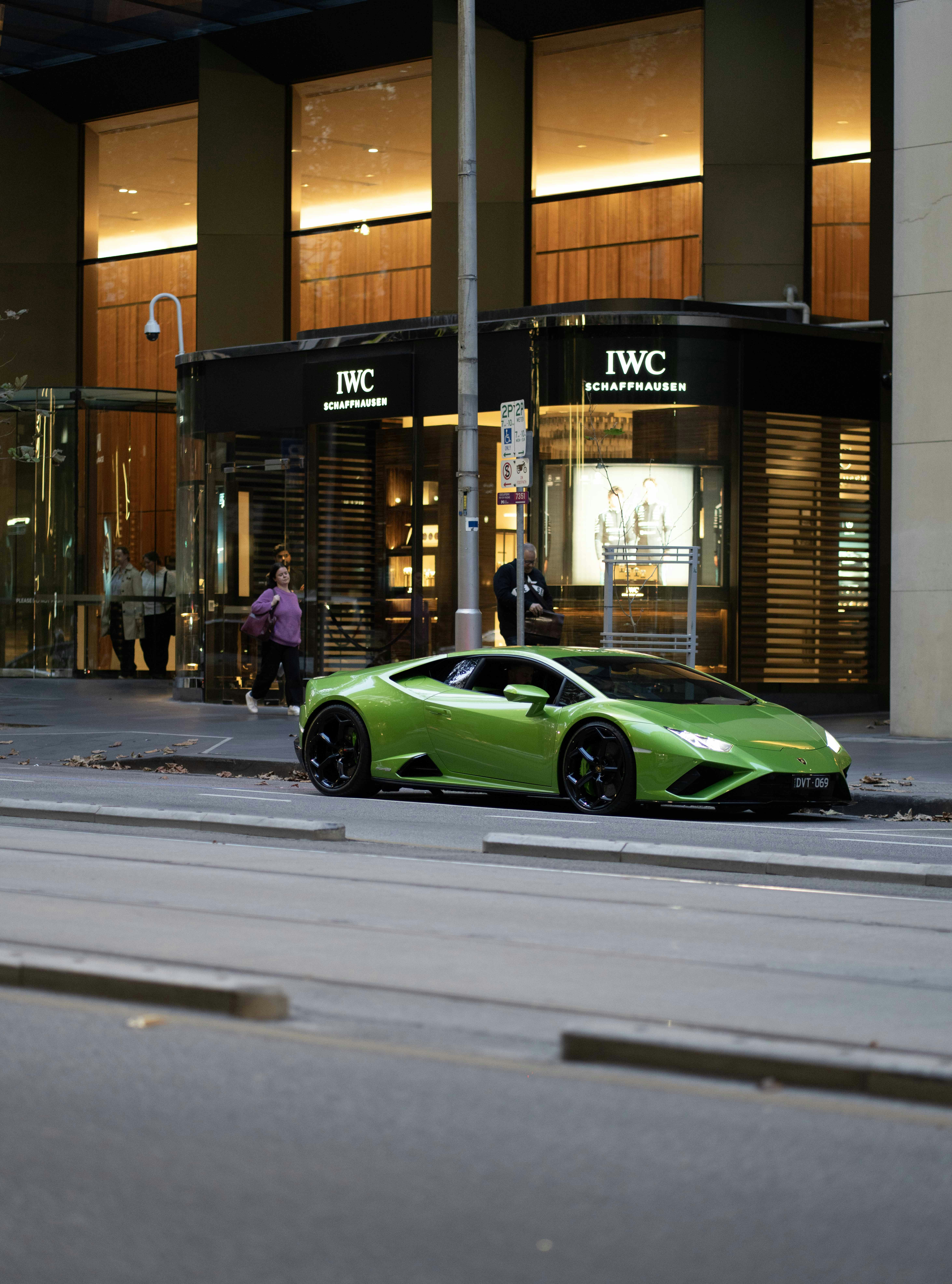 Lime Roadster in Front of IWC Boutique
