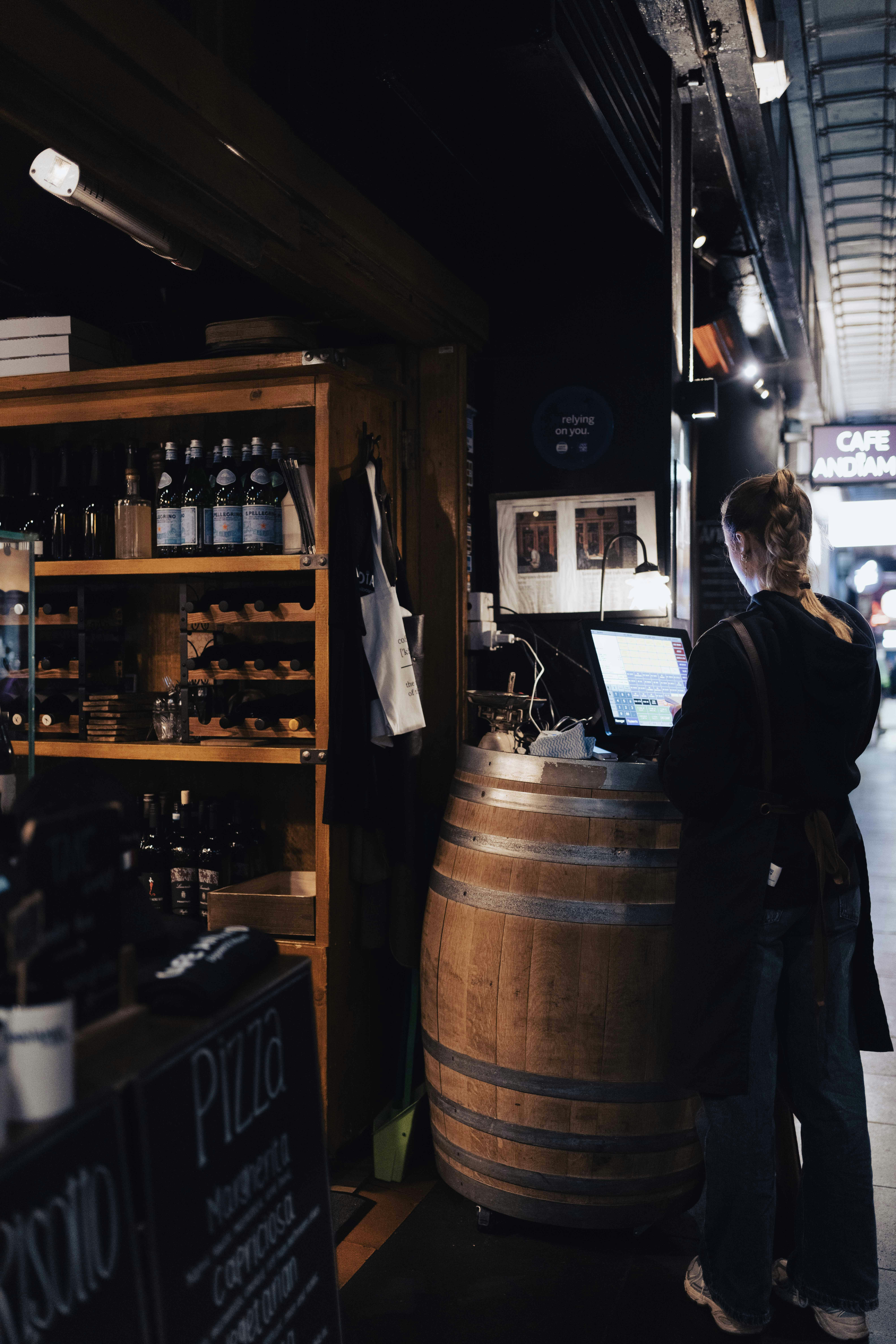 Barrel and Barista at Twilight: A Quiet Café Interaction