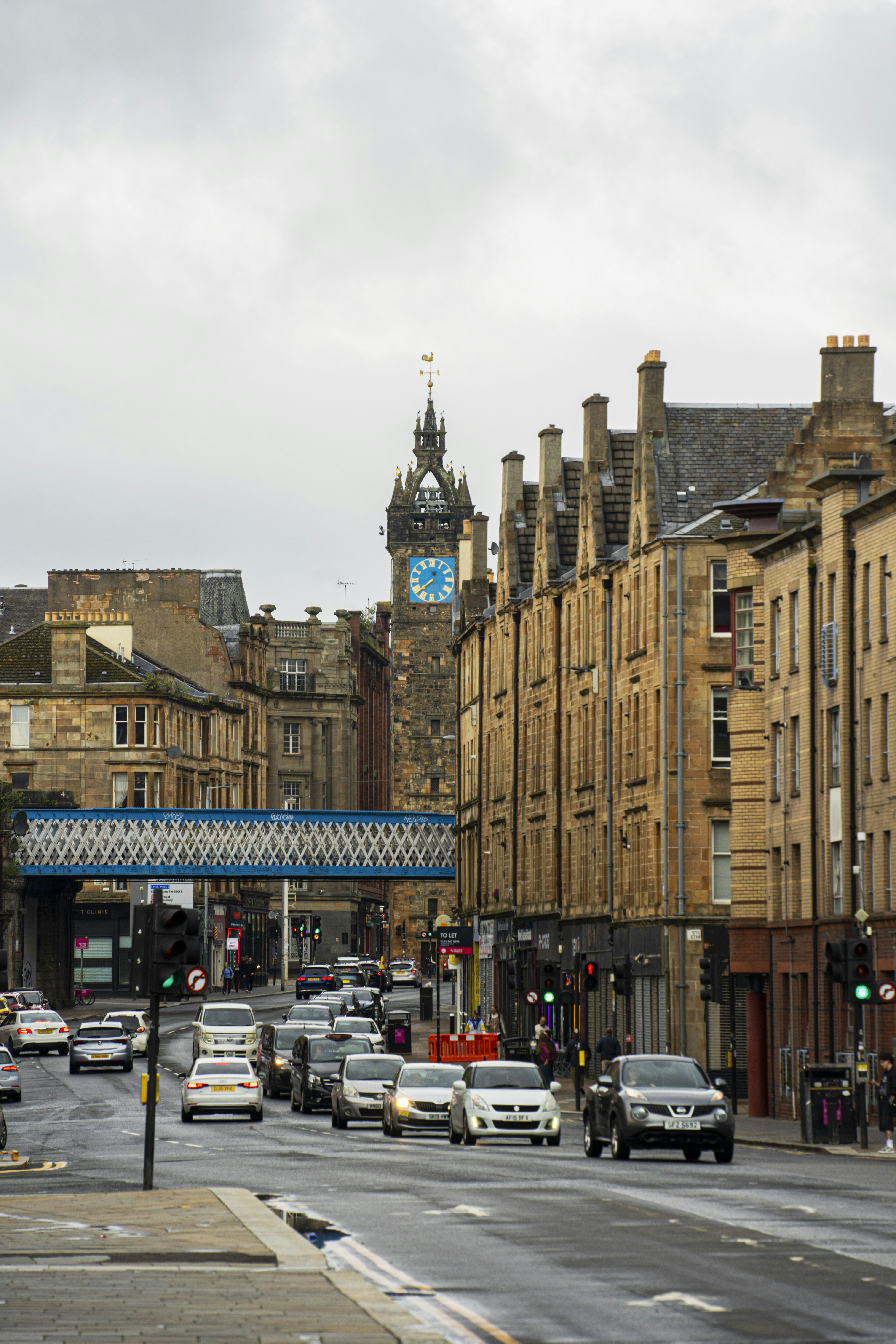 Clock-Tower Chase: Georgian Street with Blue Bridge Overpass