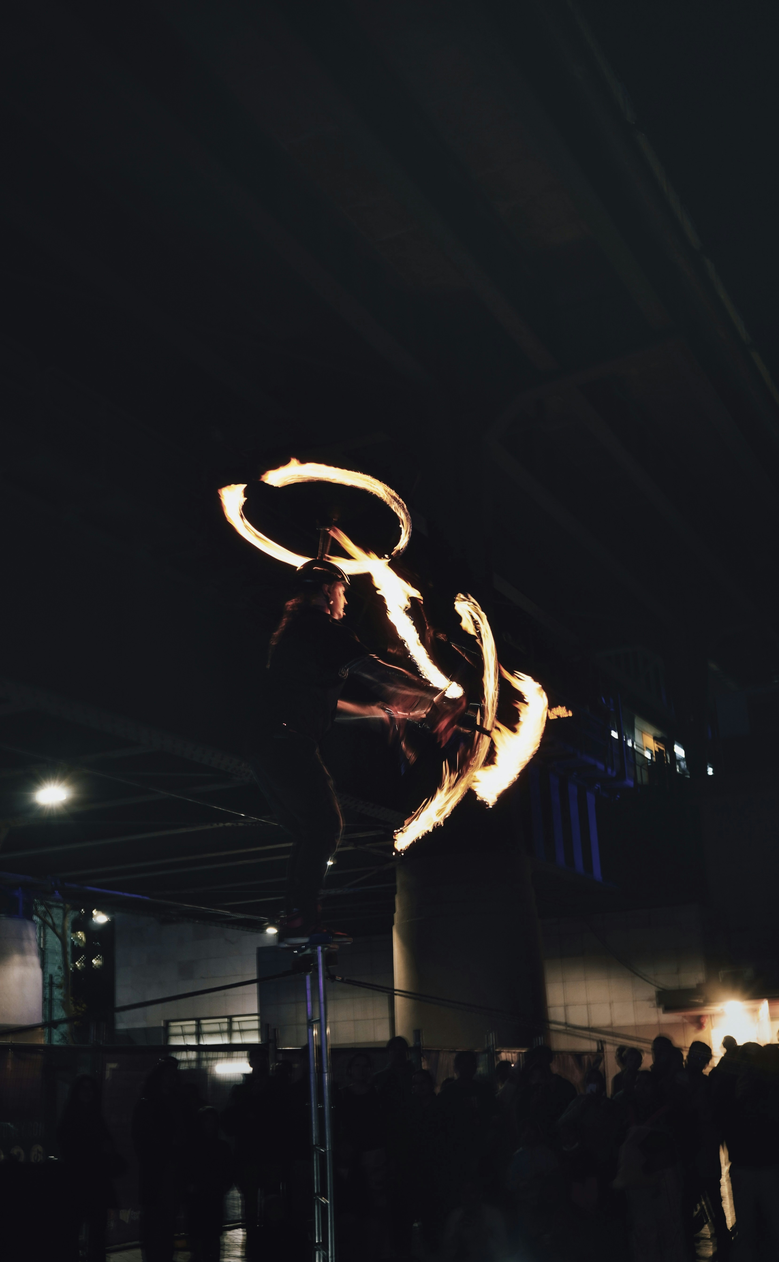 Fiery Ribbons in a Midnight Circus