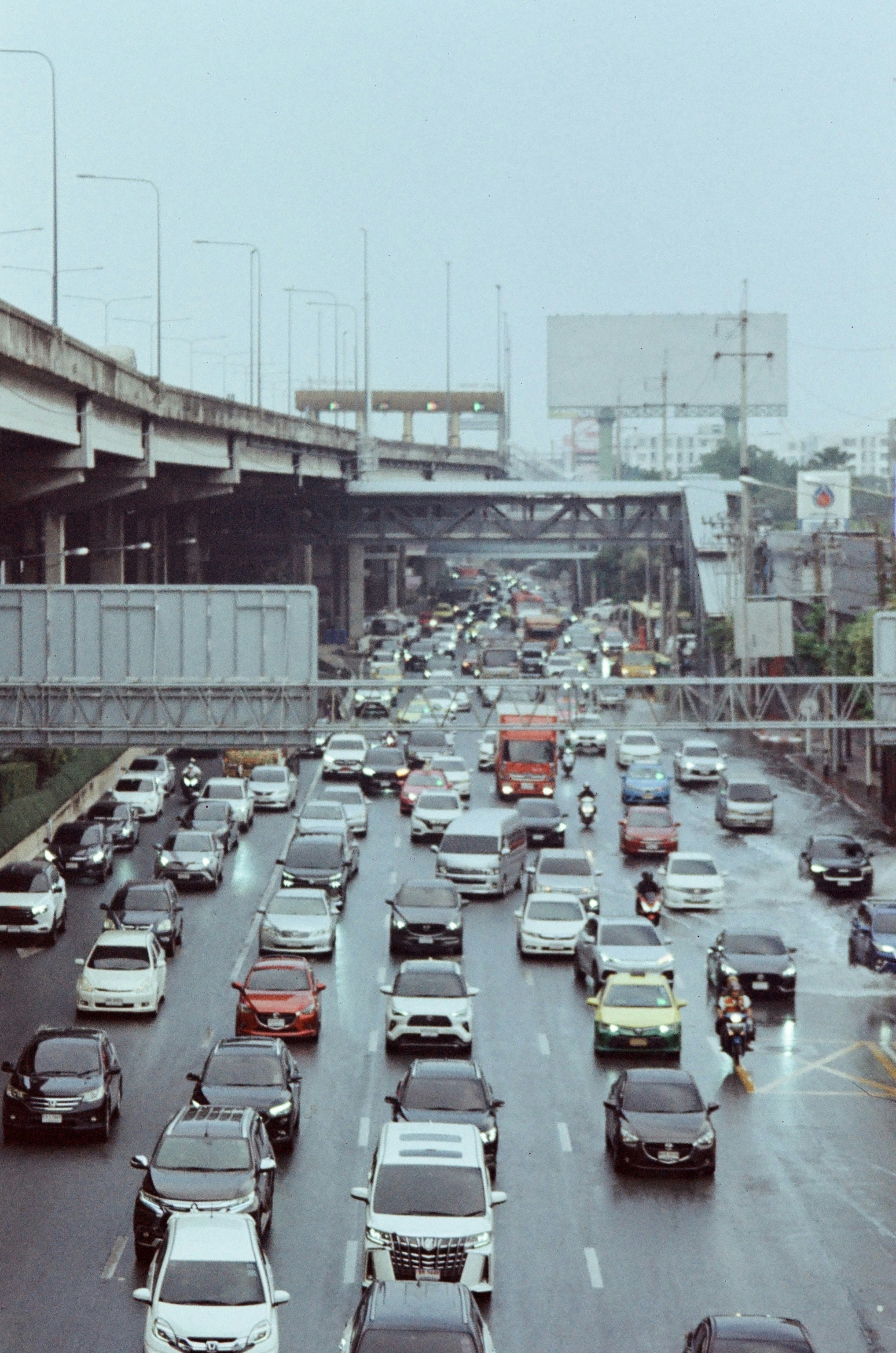 Heavy traffic on a multi-lane urban highway.