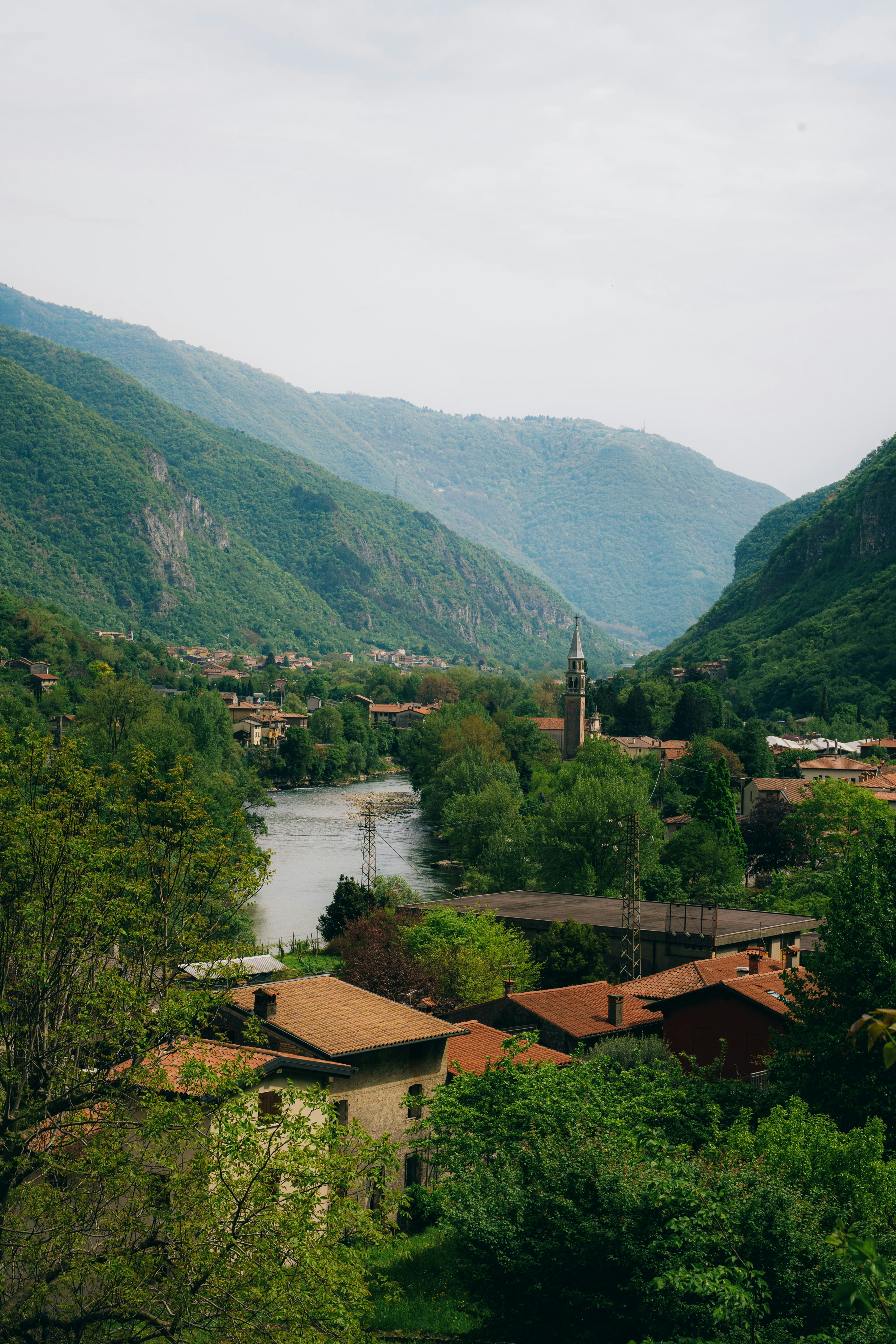 Valley Clocktower Overlooking a River Village