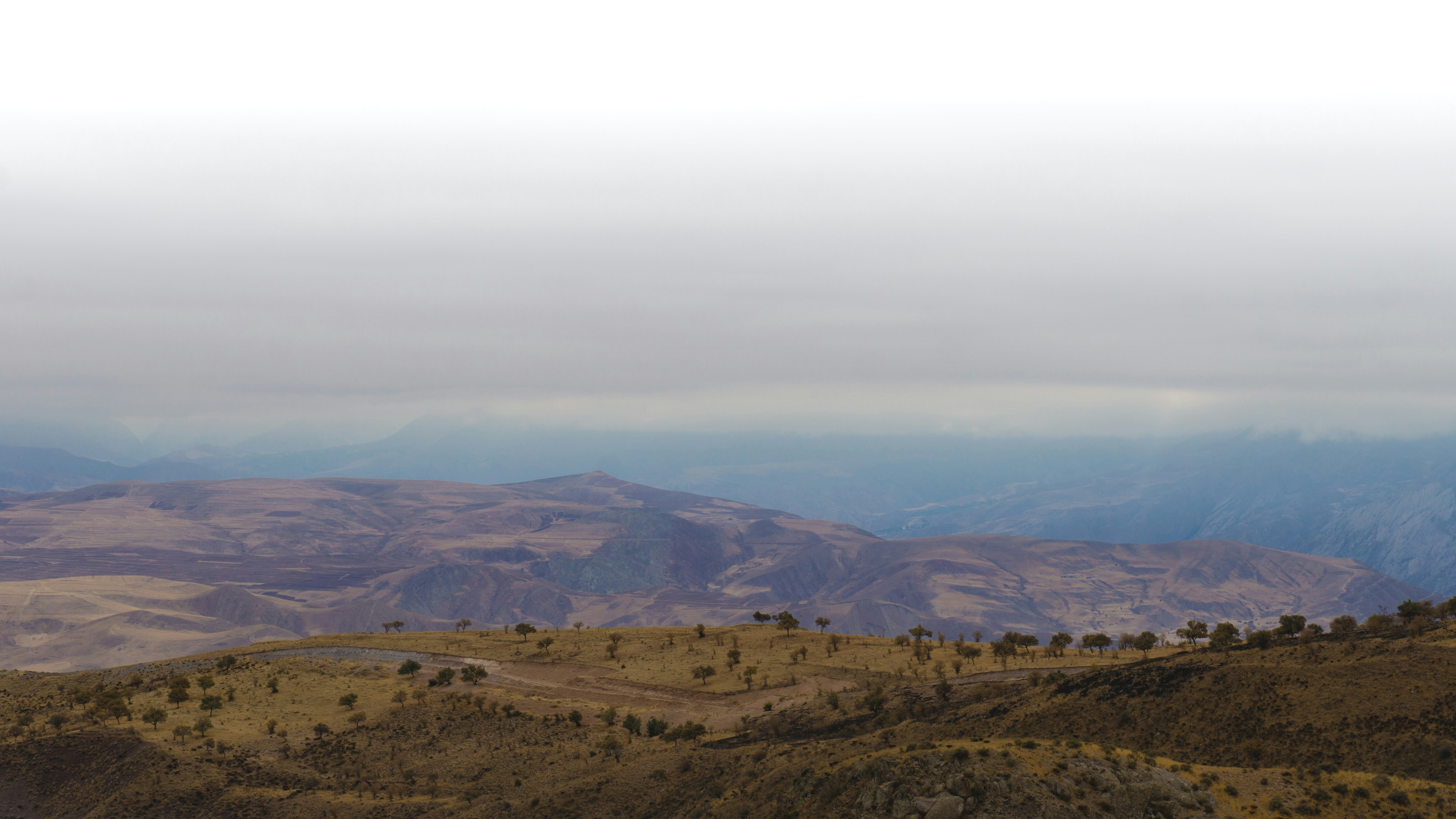 Horizon Weave: Desert Hills Under a Hall of Clouds