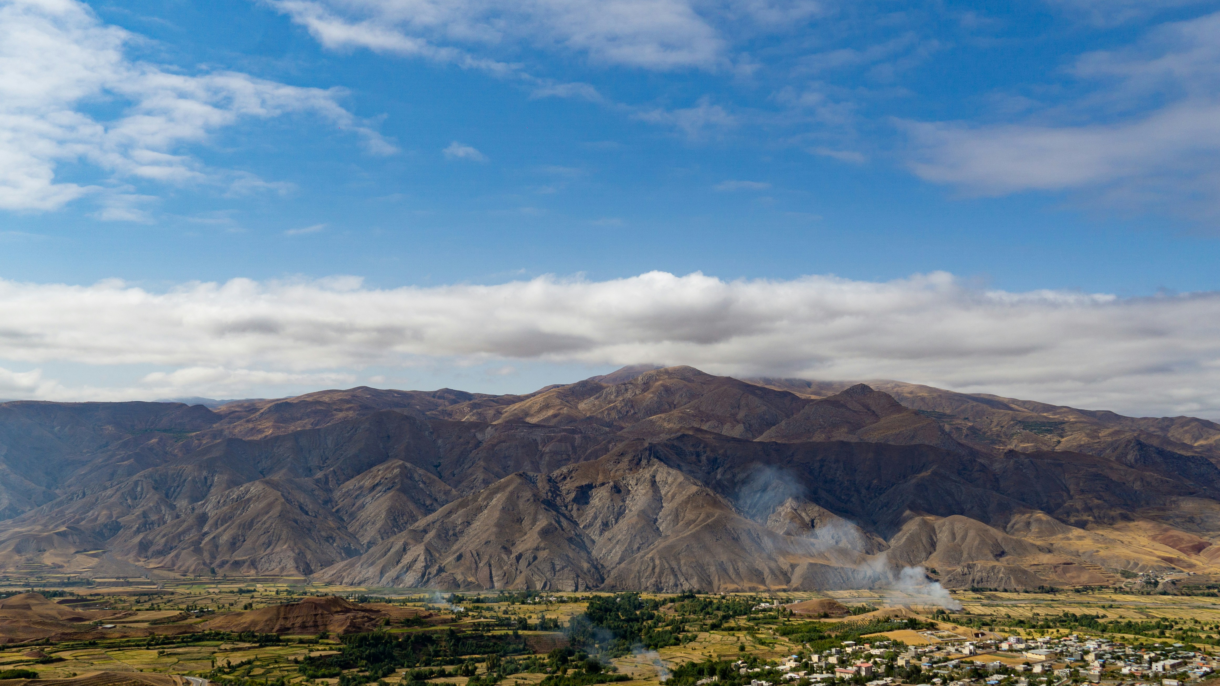 Desert Valley Panorama at Distant Mountain Foothills