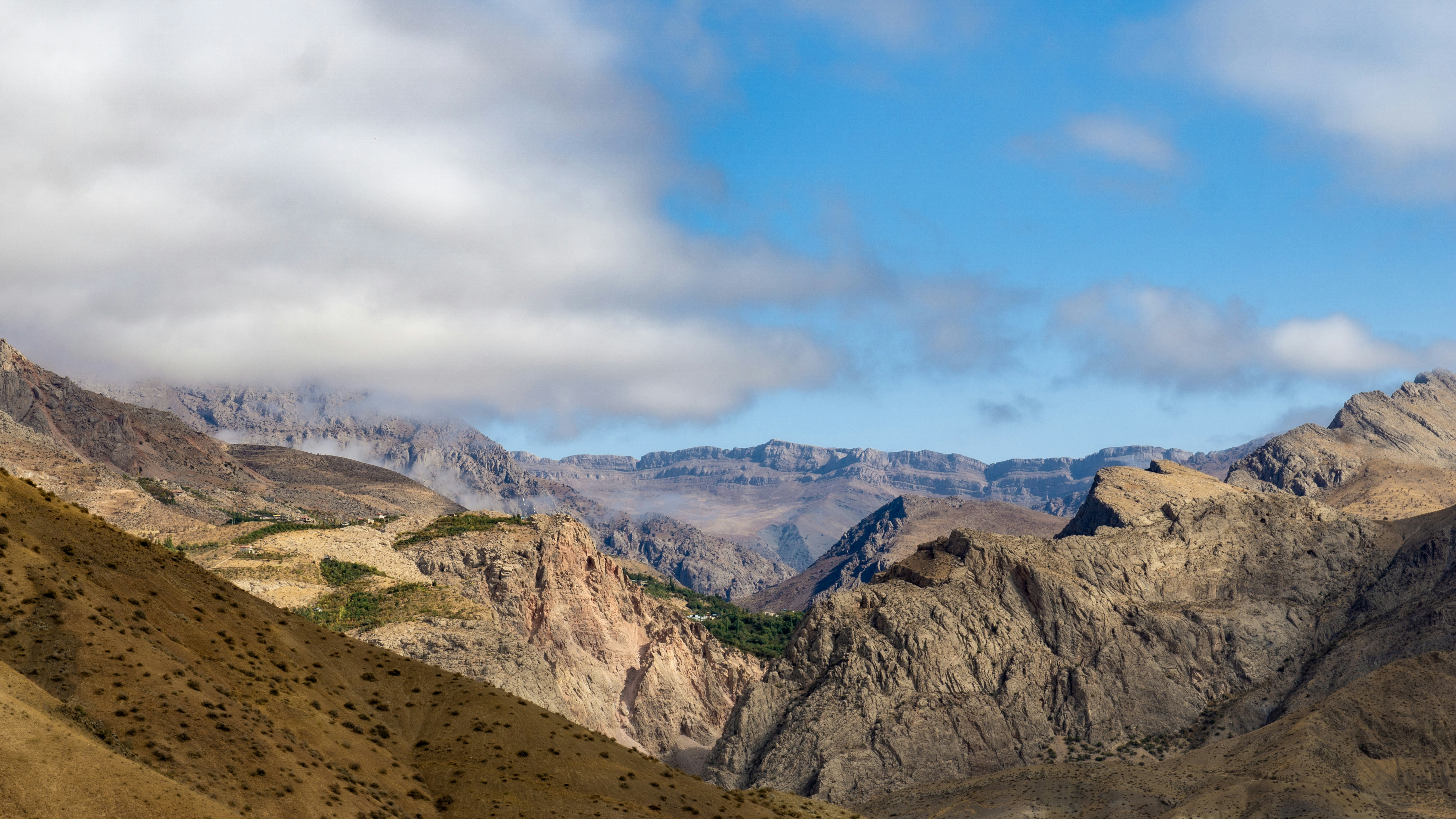 Desert Canyon Horizon under a Patchwork Sky