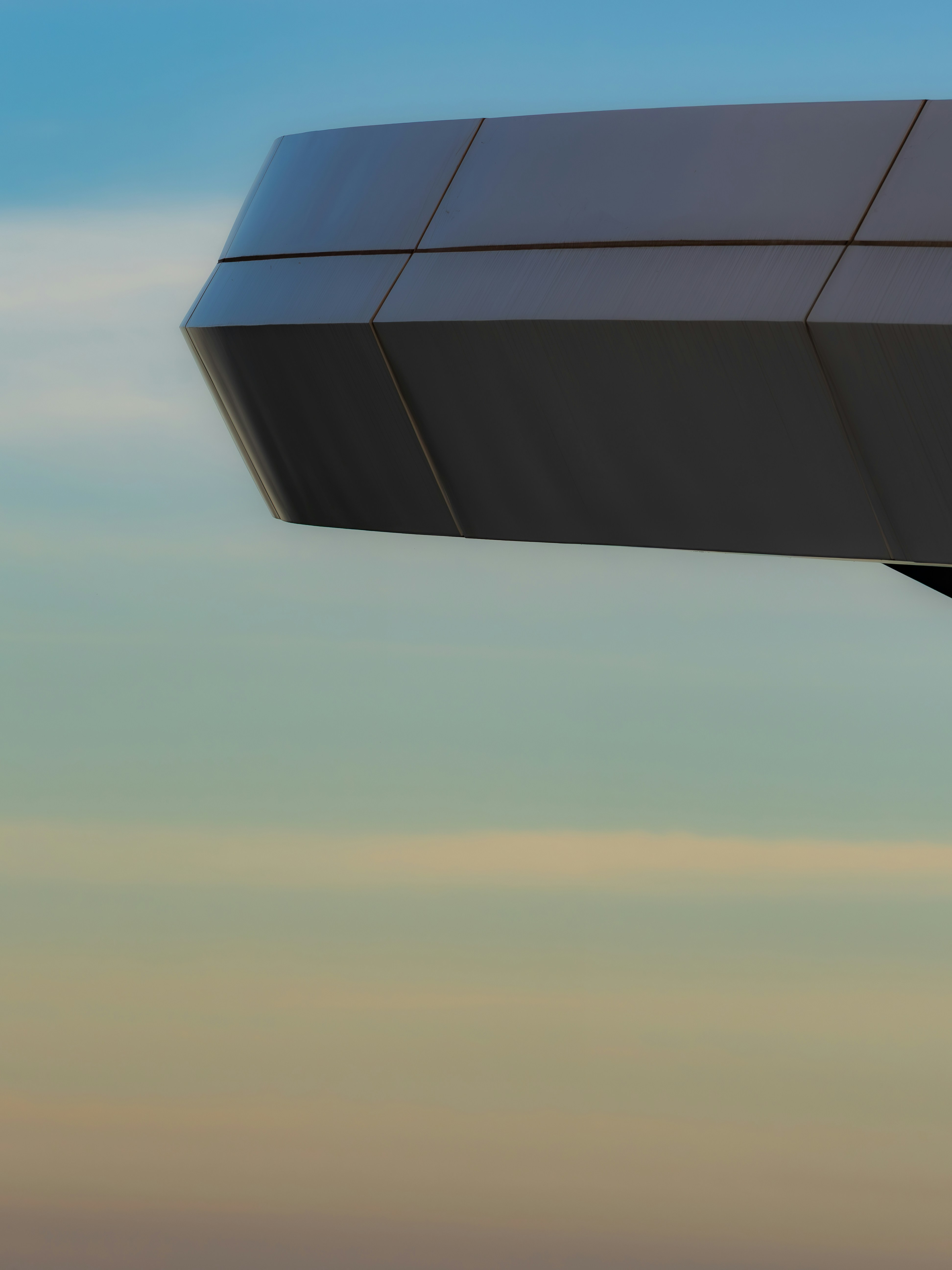 Wing Over Twilight: A Minimalist Jet Highlight