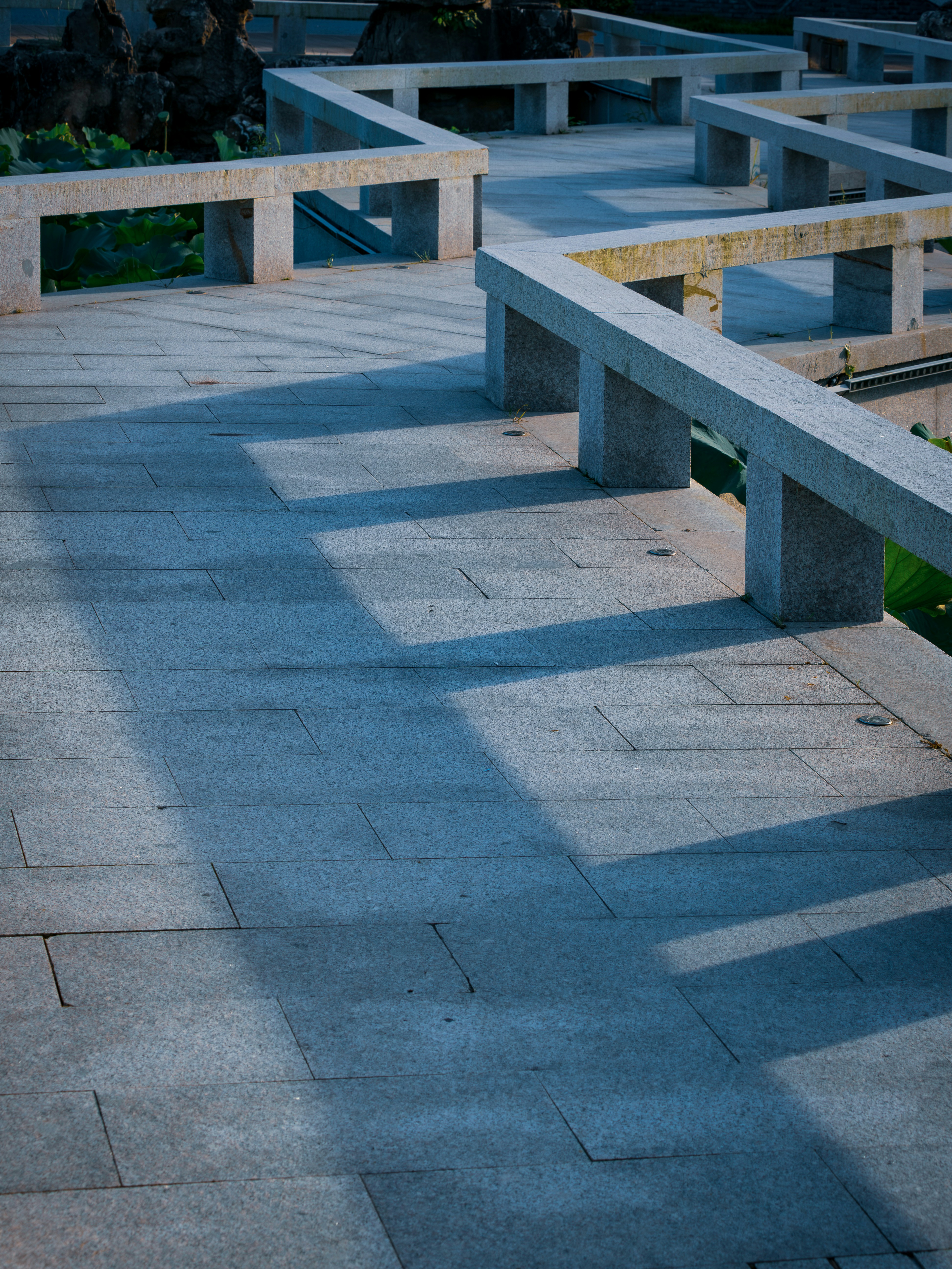 Shadows Across a Tiled Terrace