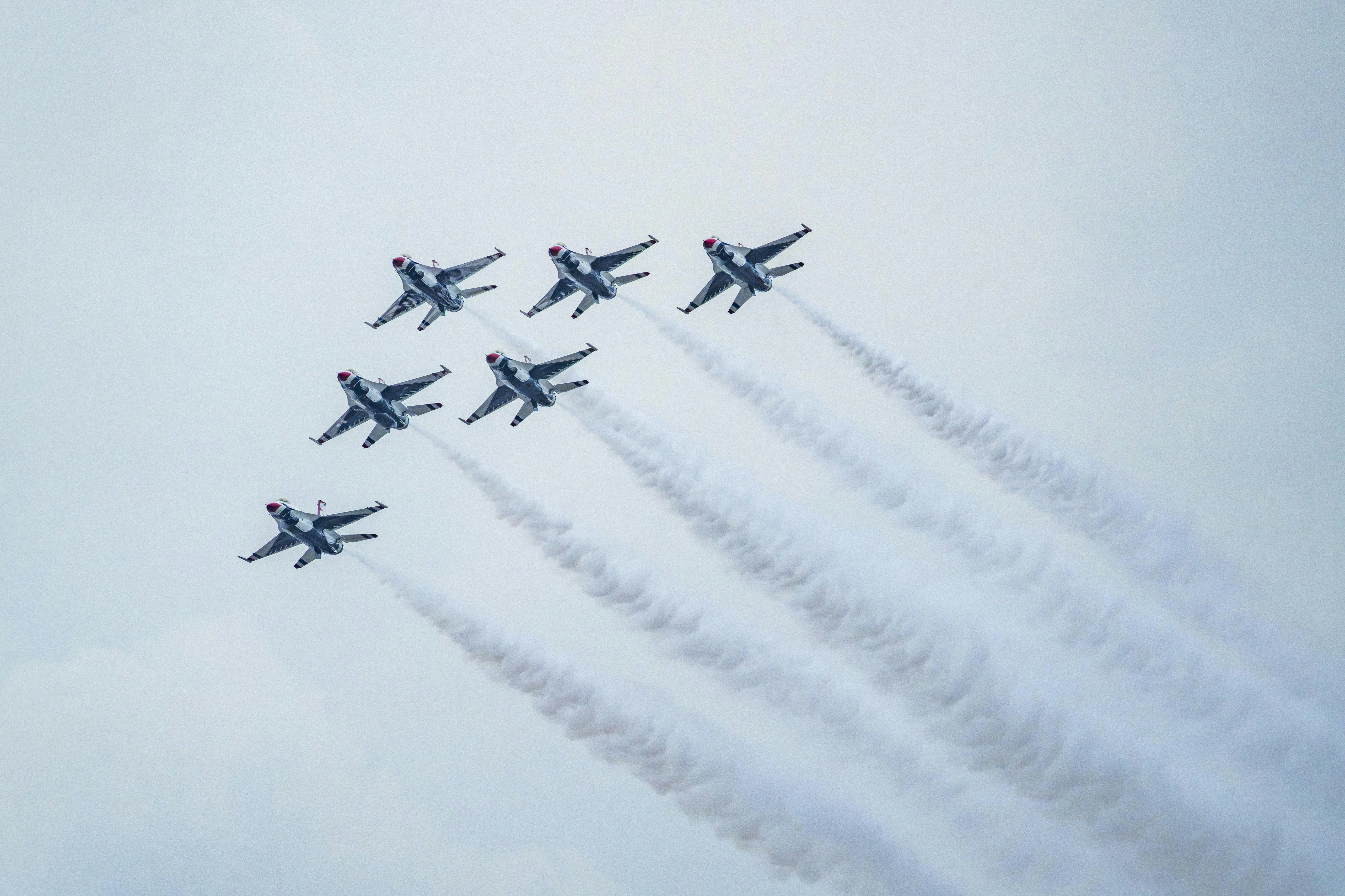 Diamond Skyflight: Arrow-headed Jet Formation Carves Through Vapor Trails
