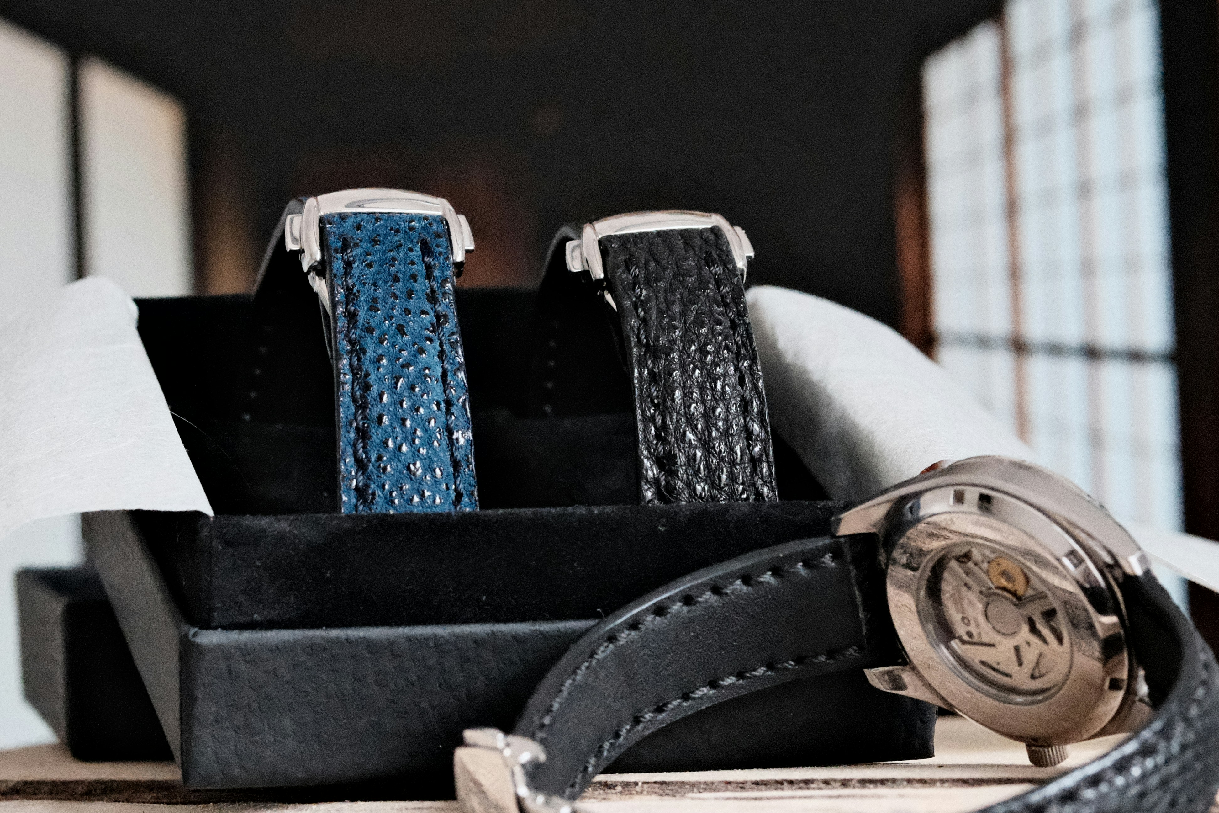 Glimpse of Precision: A Timepiece Array in a Leather Carousel