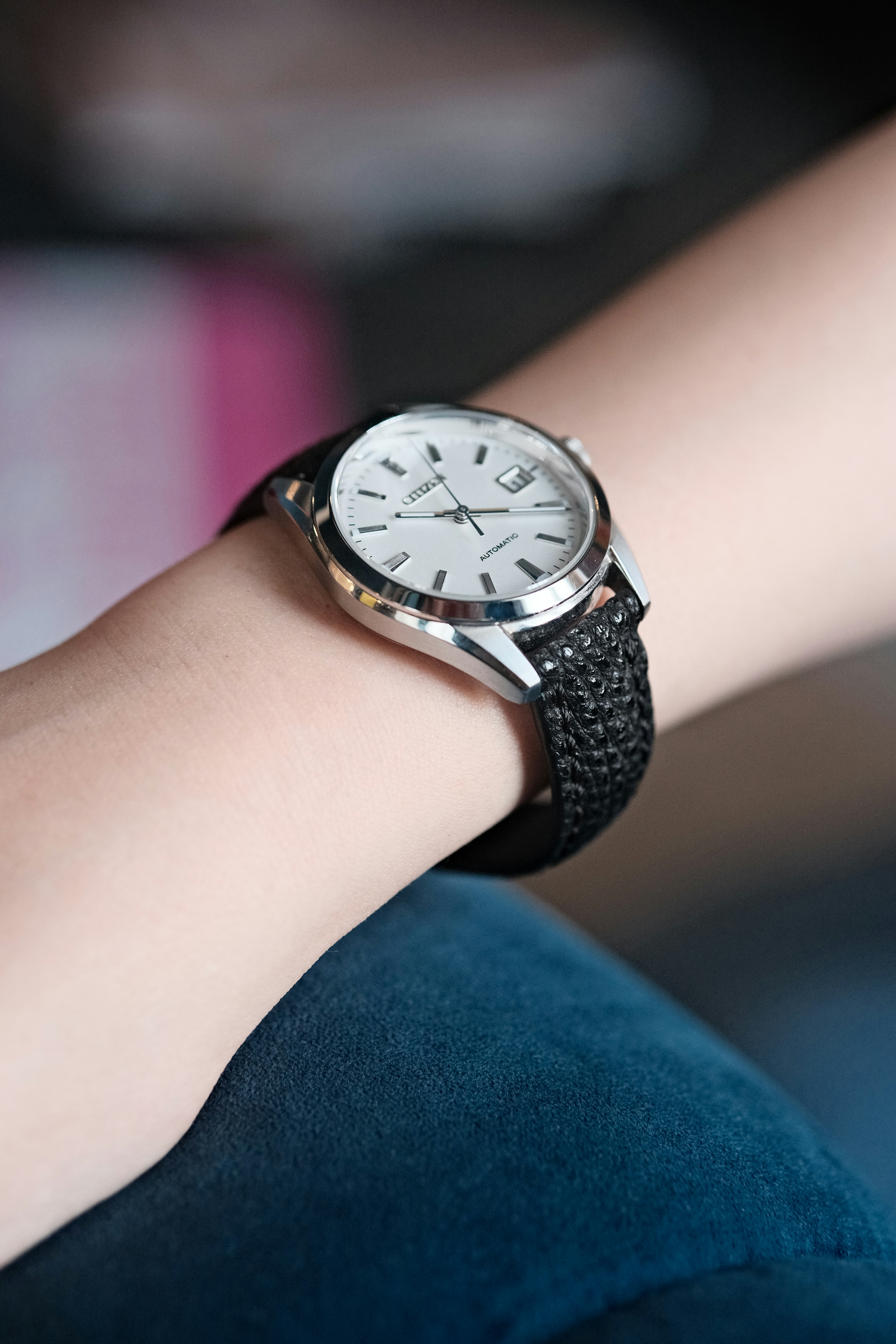 Silver Wristwatch Anchored to a Quiet Moment
