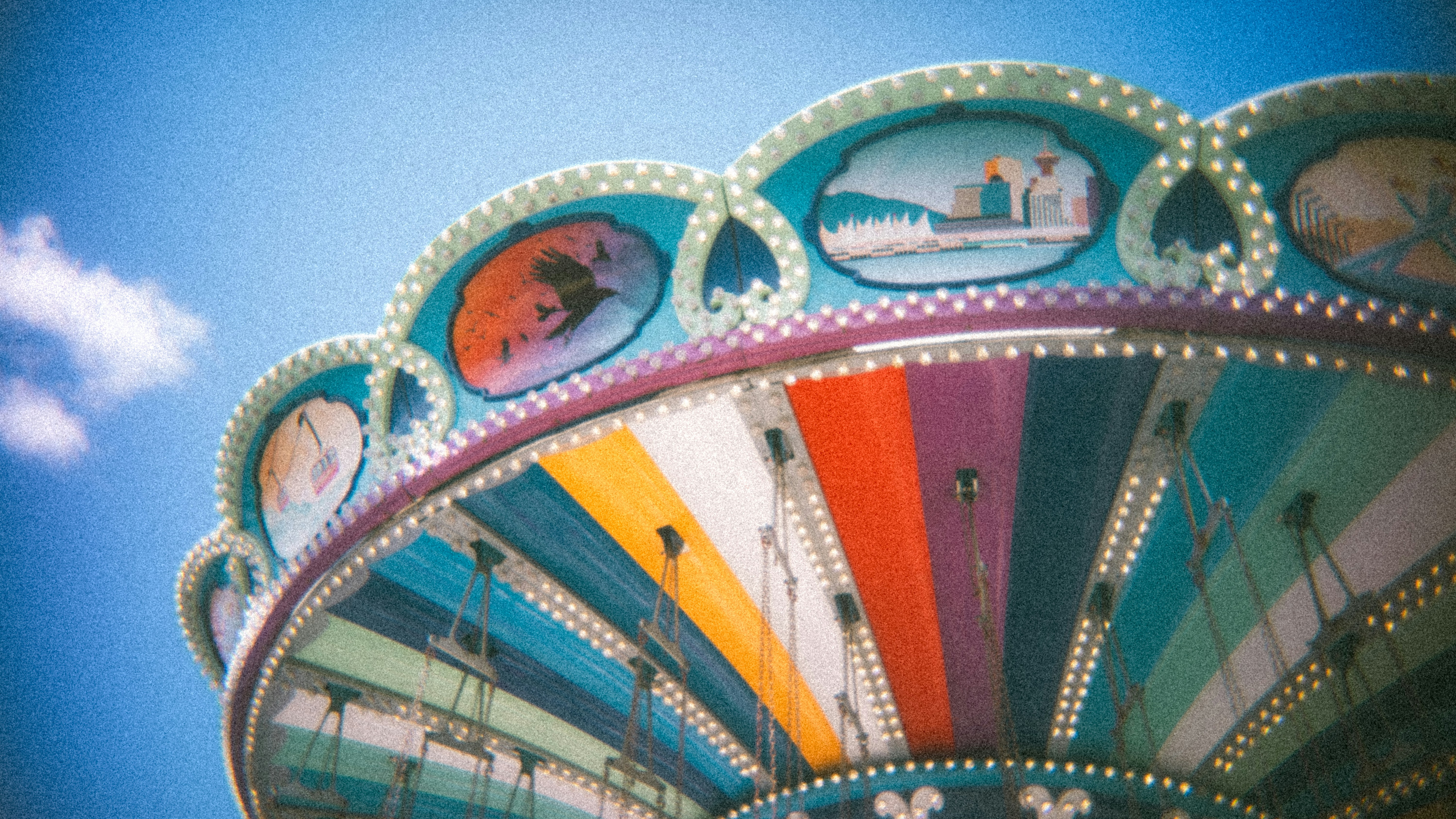 Carousel of Color: A Day-Glow Ride Under Bright Skies