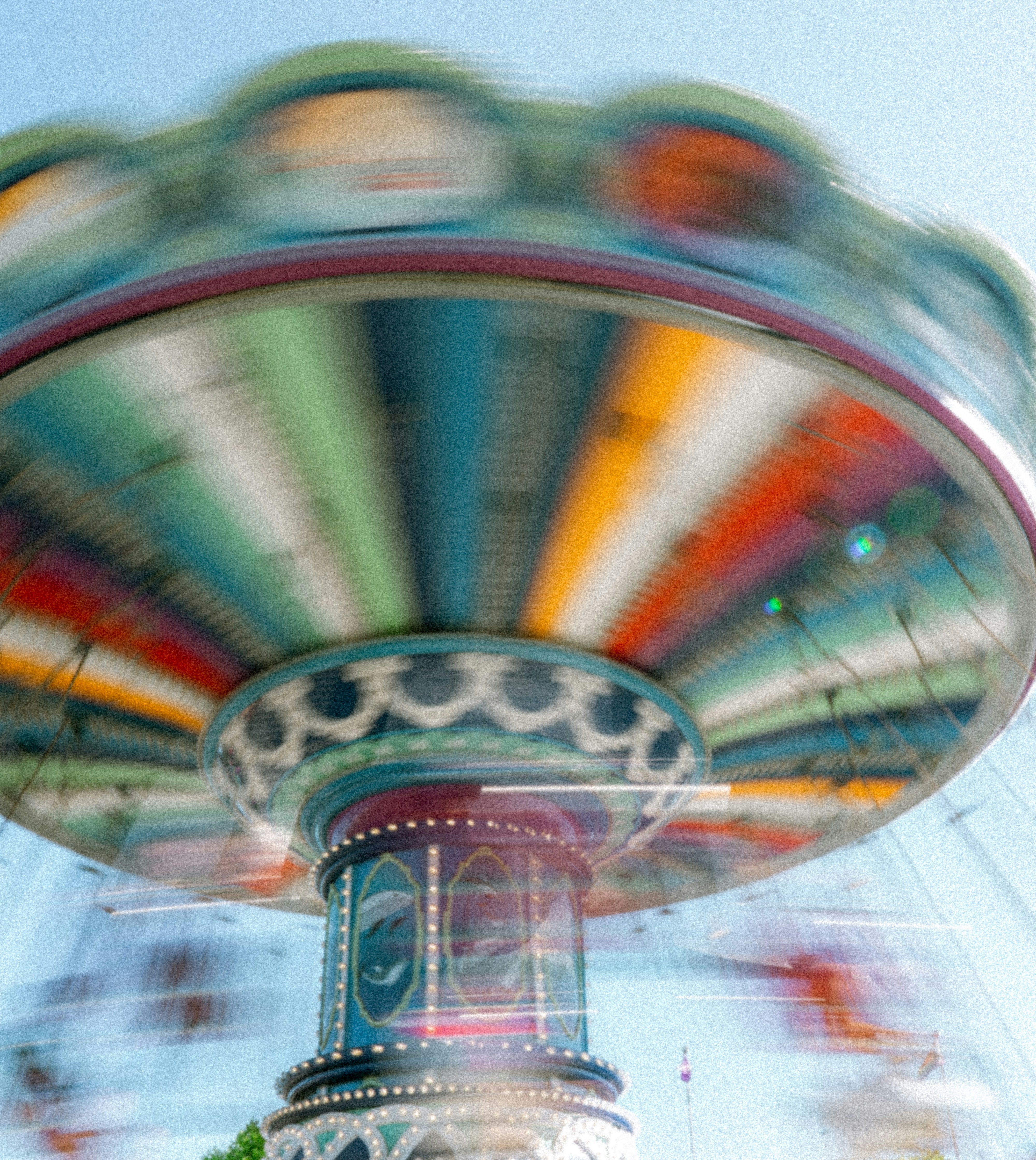 Whirling Color: A Blurred Carousel in Motion