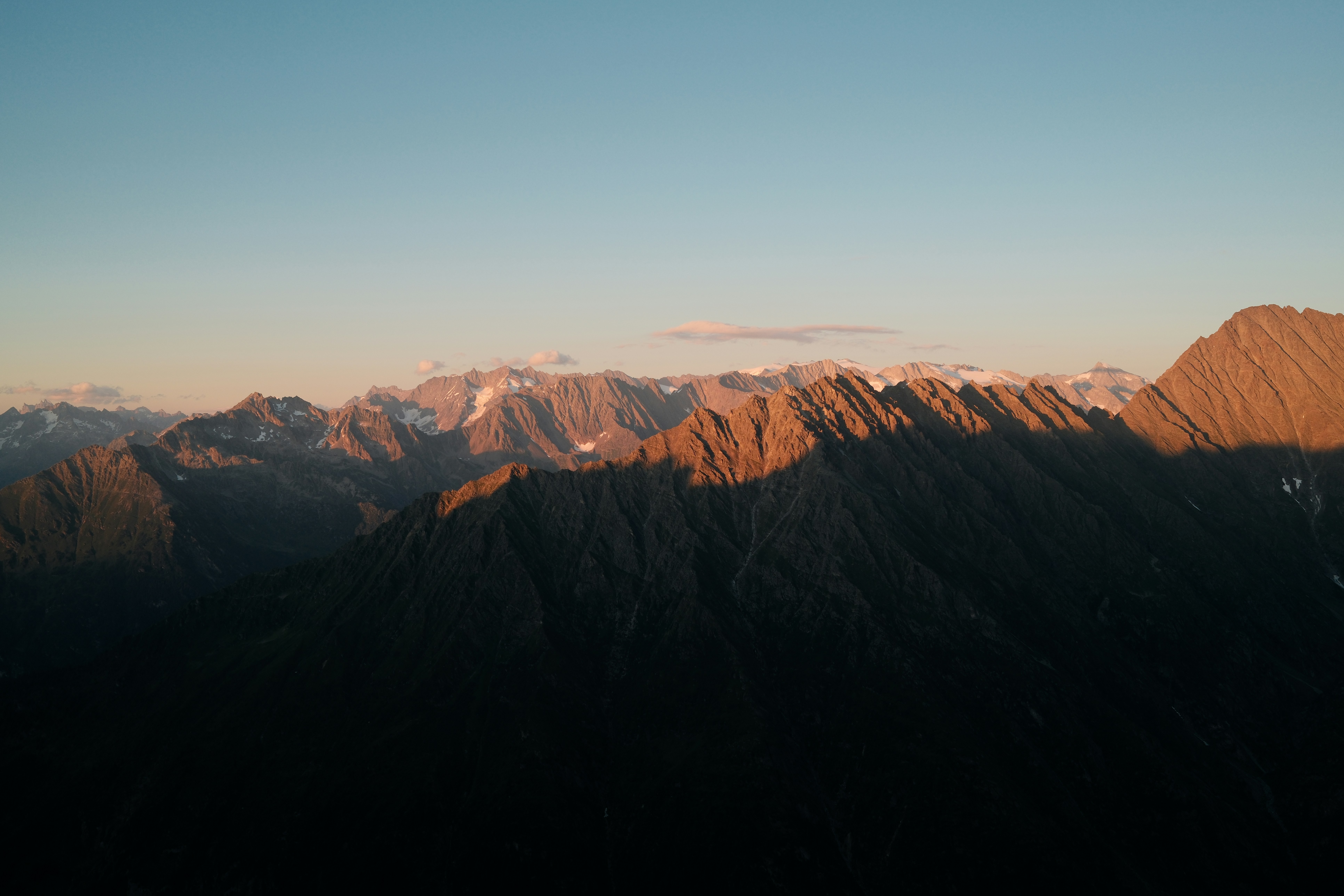 Golden Ridge: A Sunset Crown over Jagged Peaks