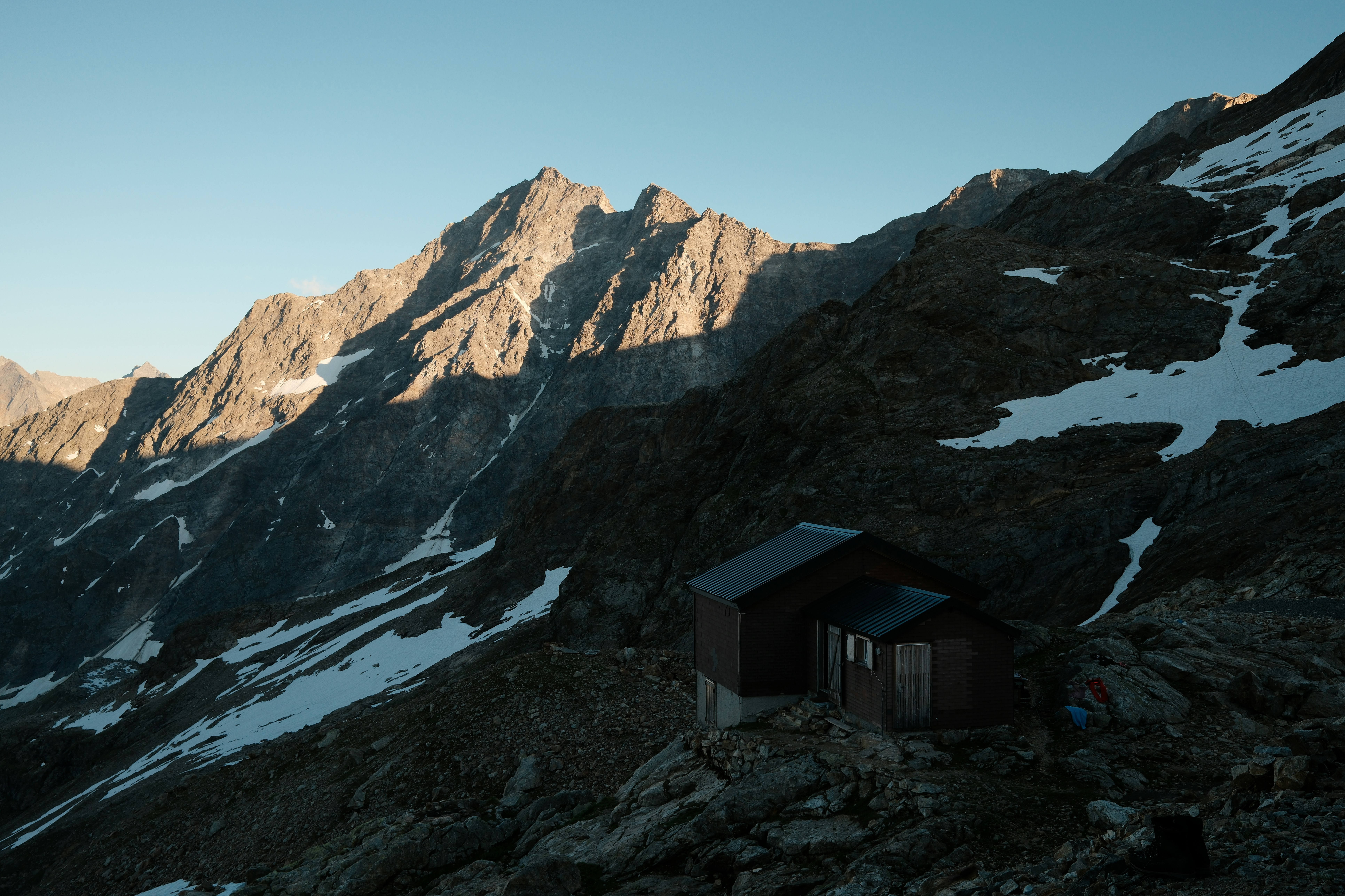 Mountain Refuge at the Edge of Light