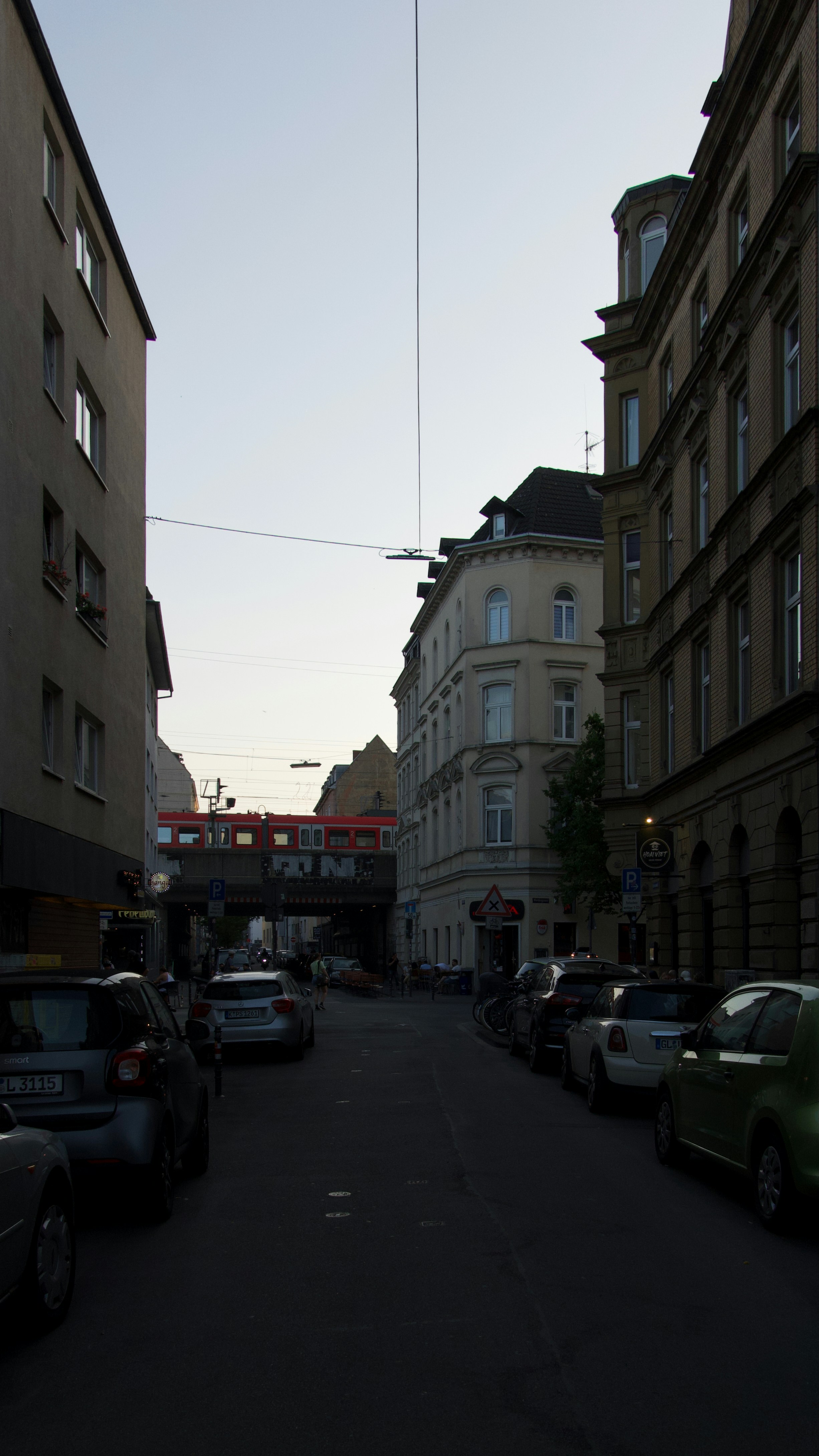 Urban Alleyway Aglow: Morning Light Between Facades