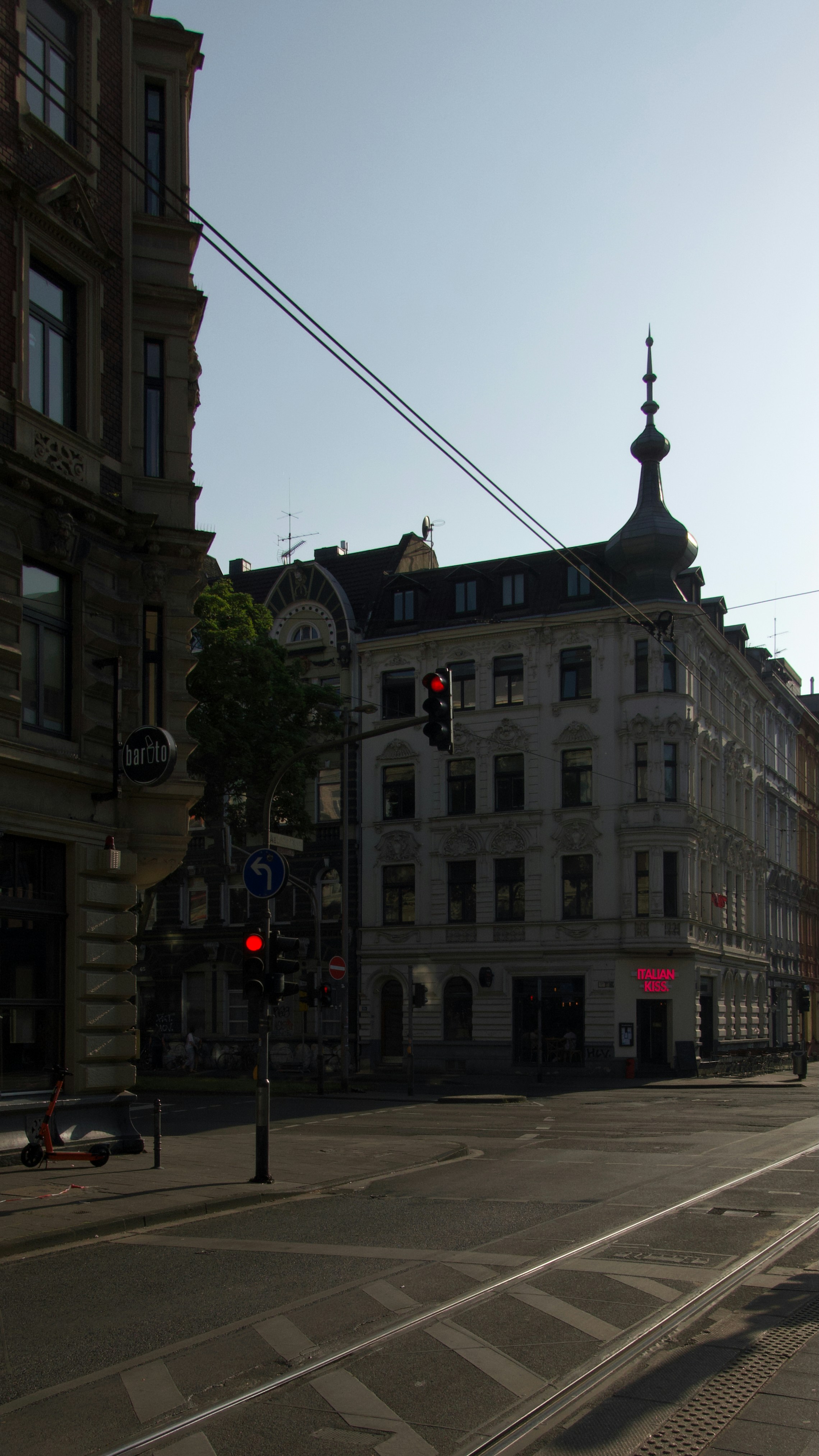 City Street at Dusk: A Heritage Façade under Cable Lines