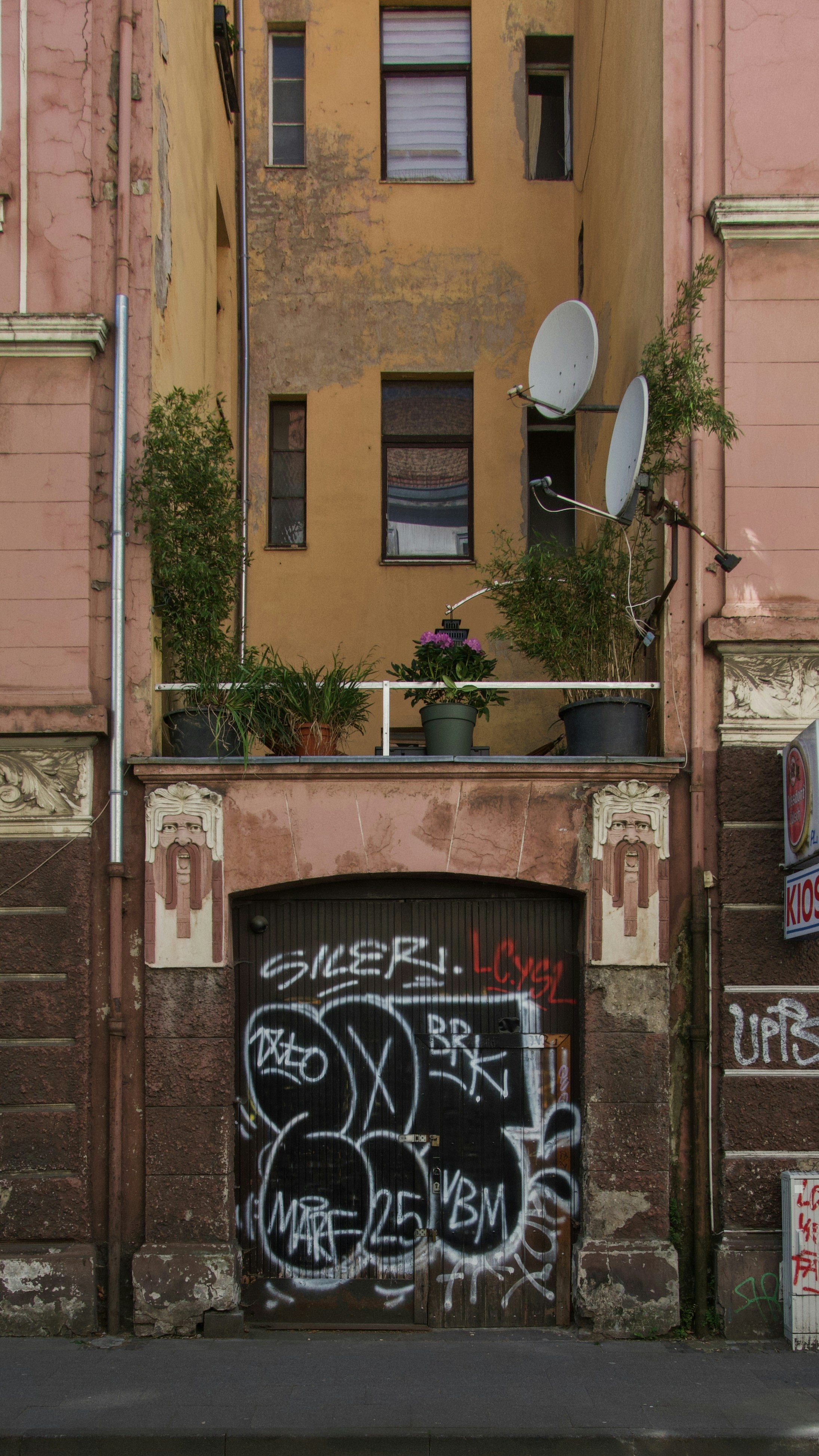 Balcony Graffiti Hideaway Under Satellite Dishes