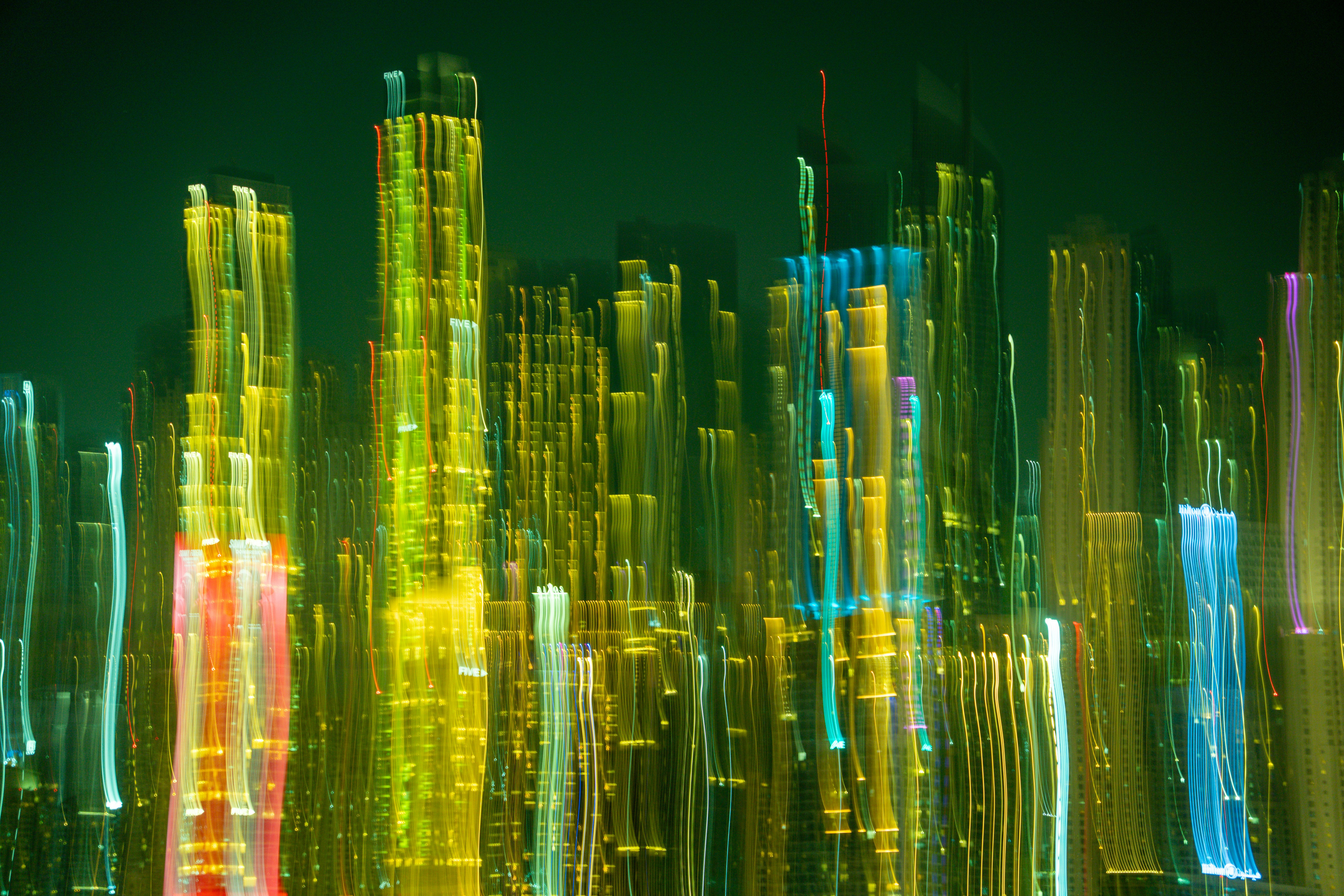 Blurred Neon Skyline: A Street of Long-Exposure Rhythm