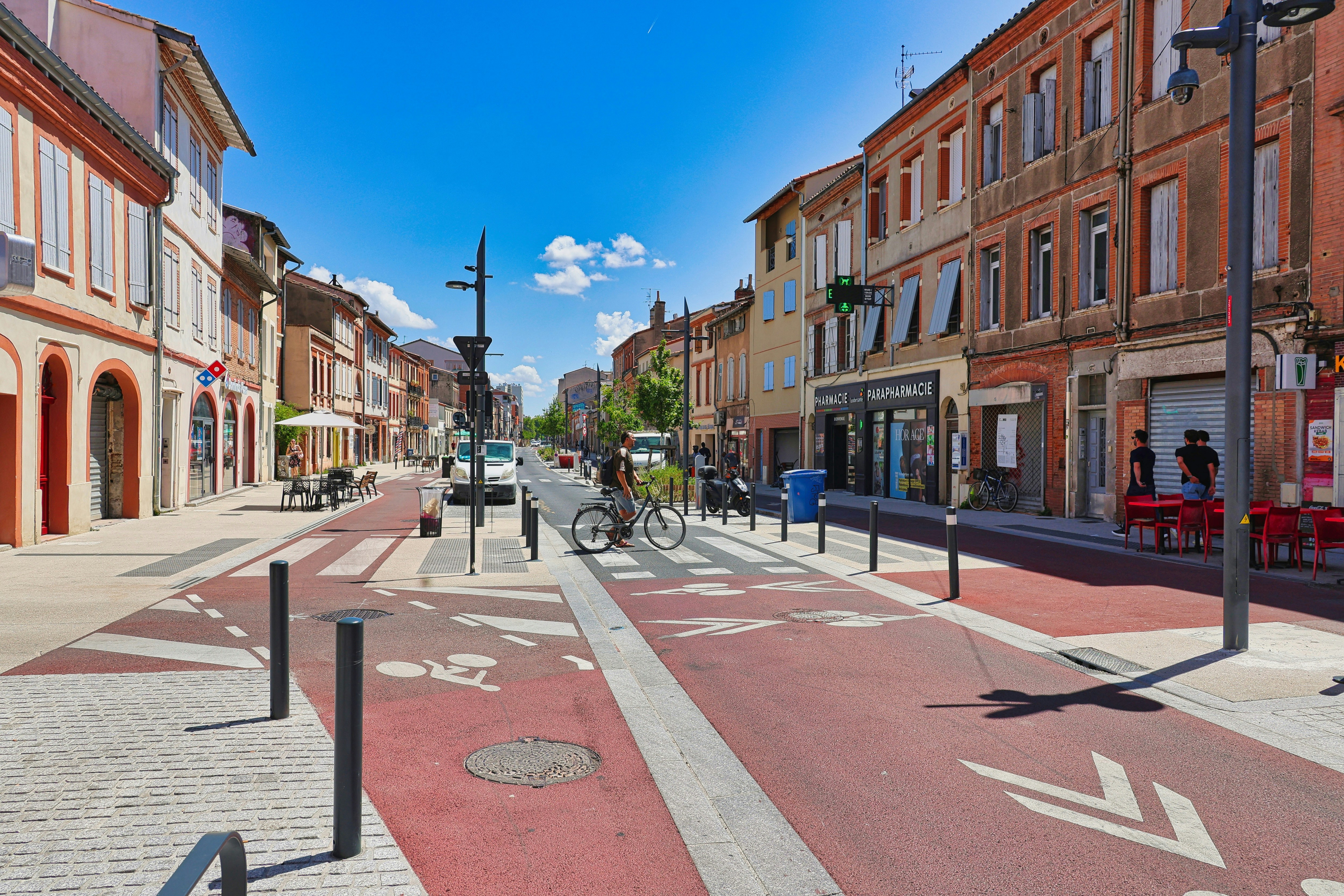 Sunny European Street with Biking Activity