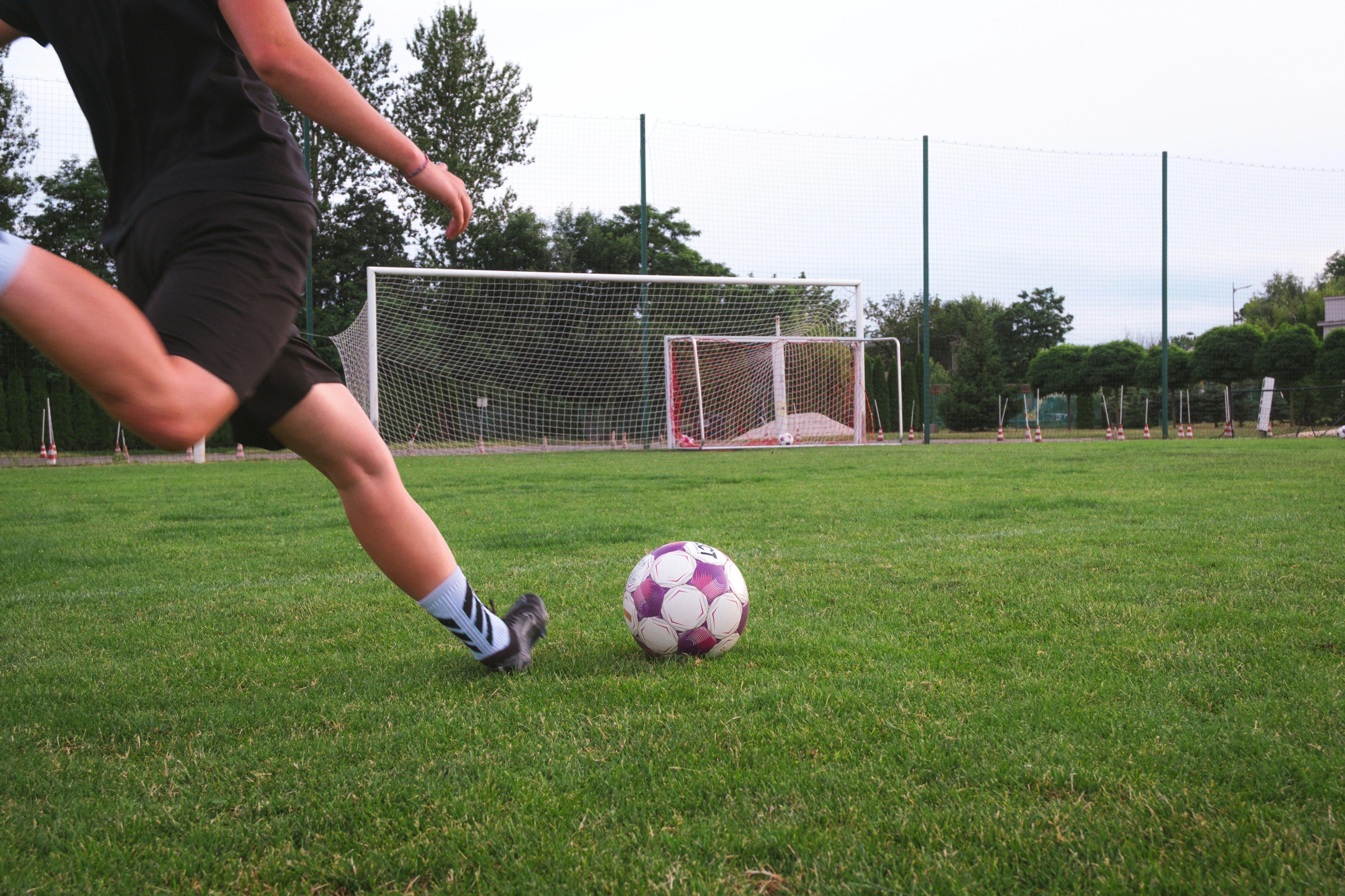 Low-angle Kick: A Soccer Moment Near the Ball