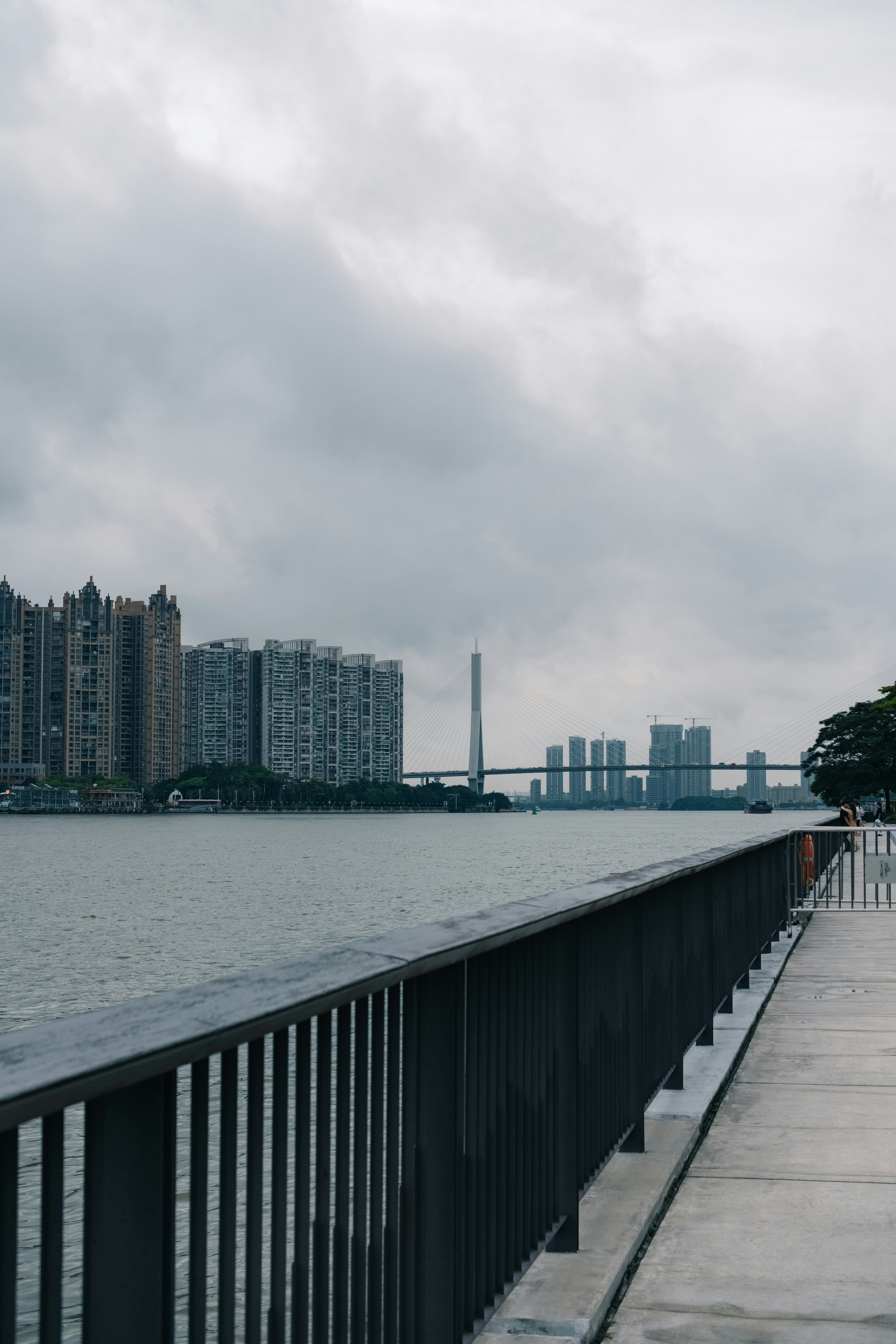 Waterfront Promenade Under Overcast Skies