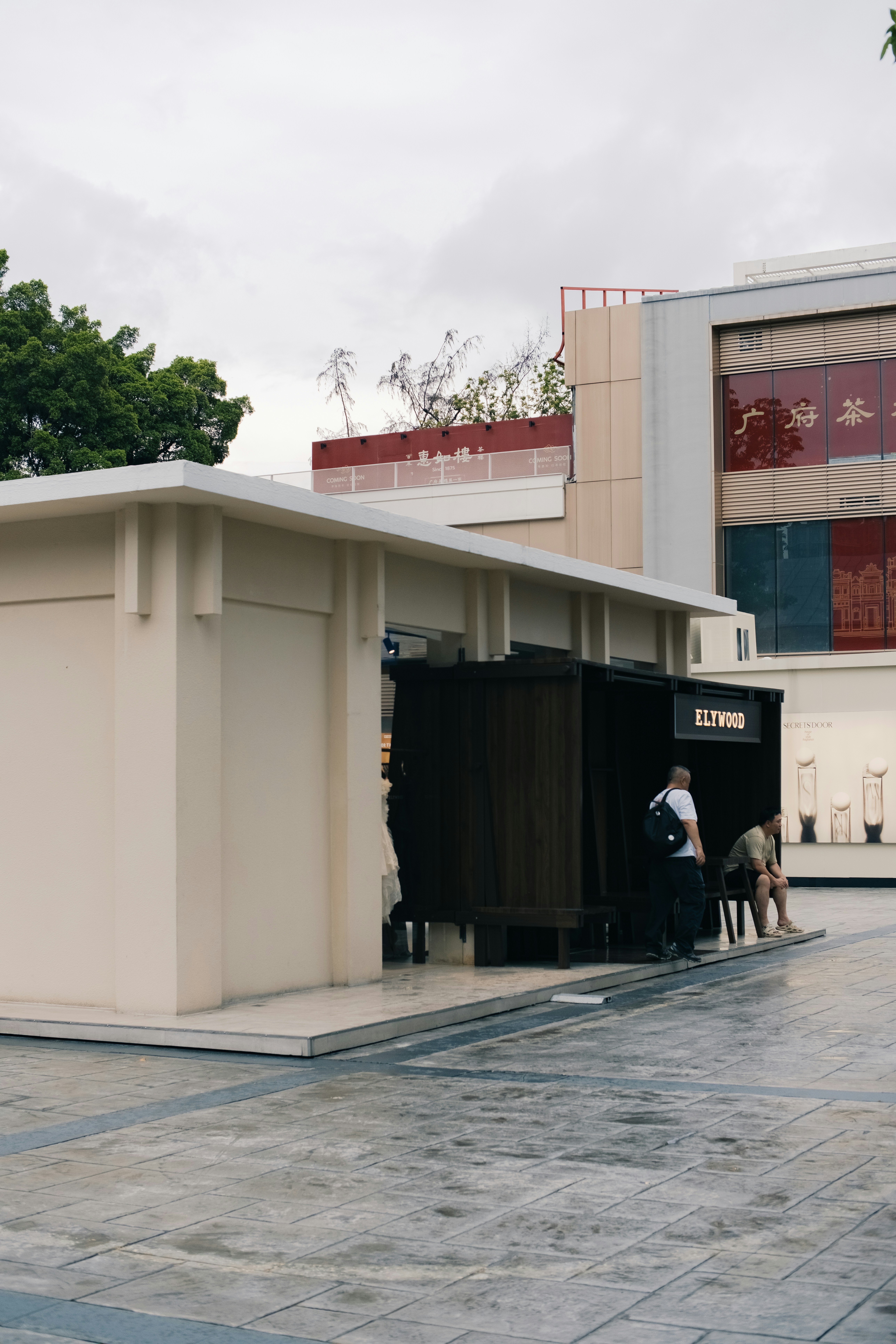 Shaded kiosk at a modern open-air plaza