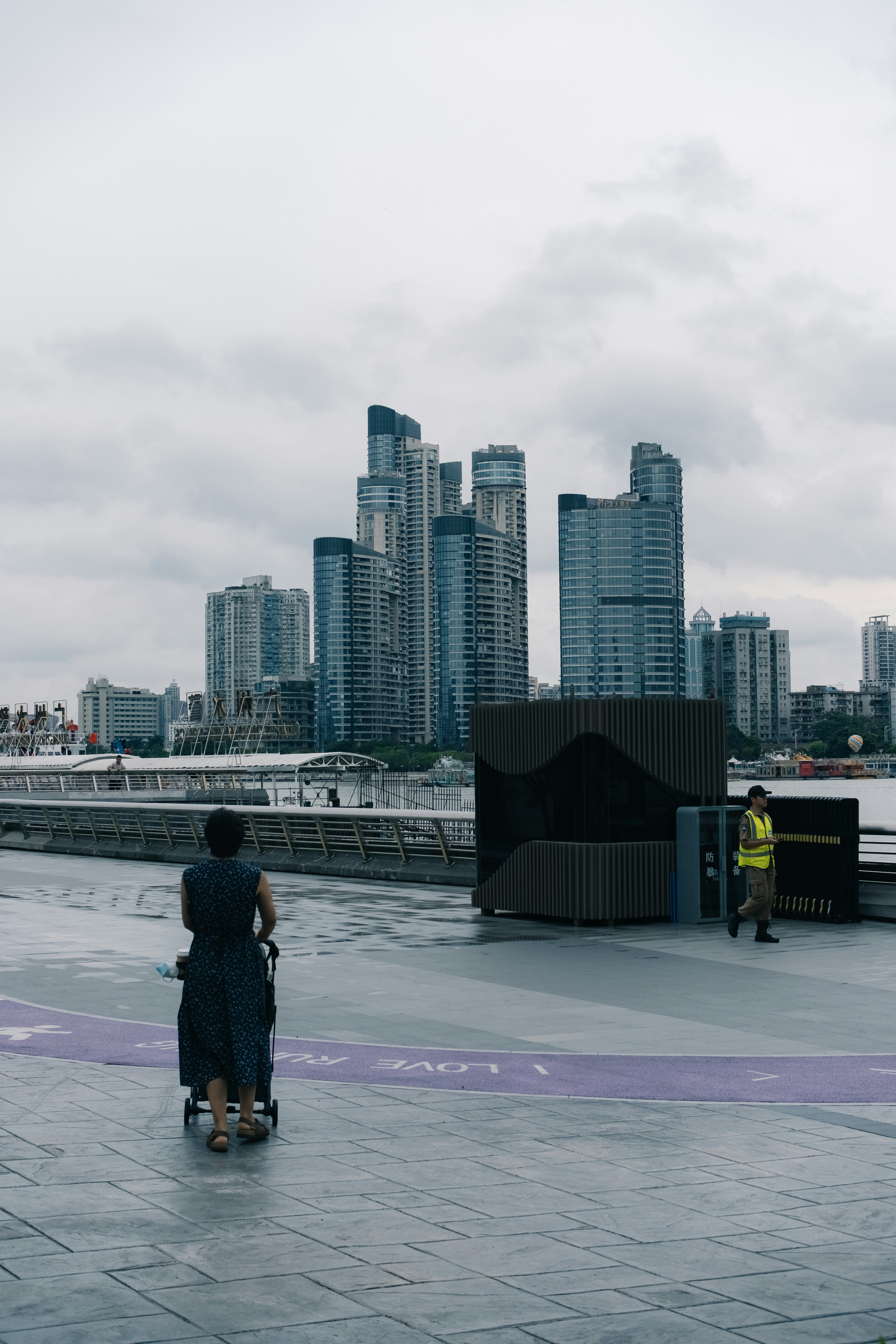 A Quiet Stroll by the Waterfront Towers