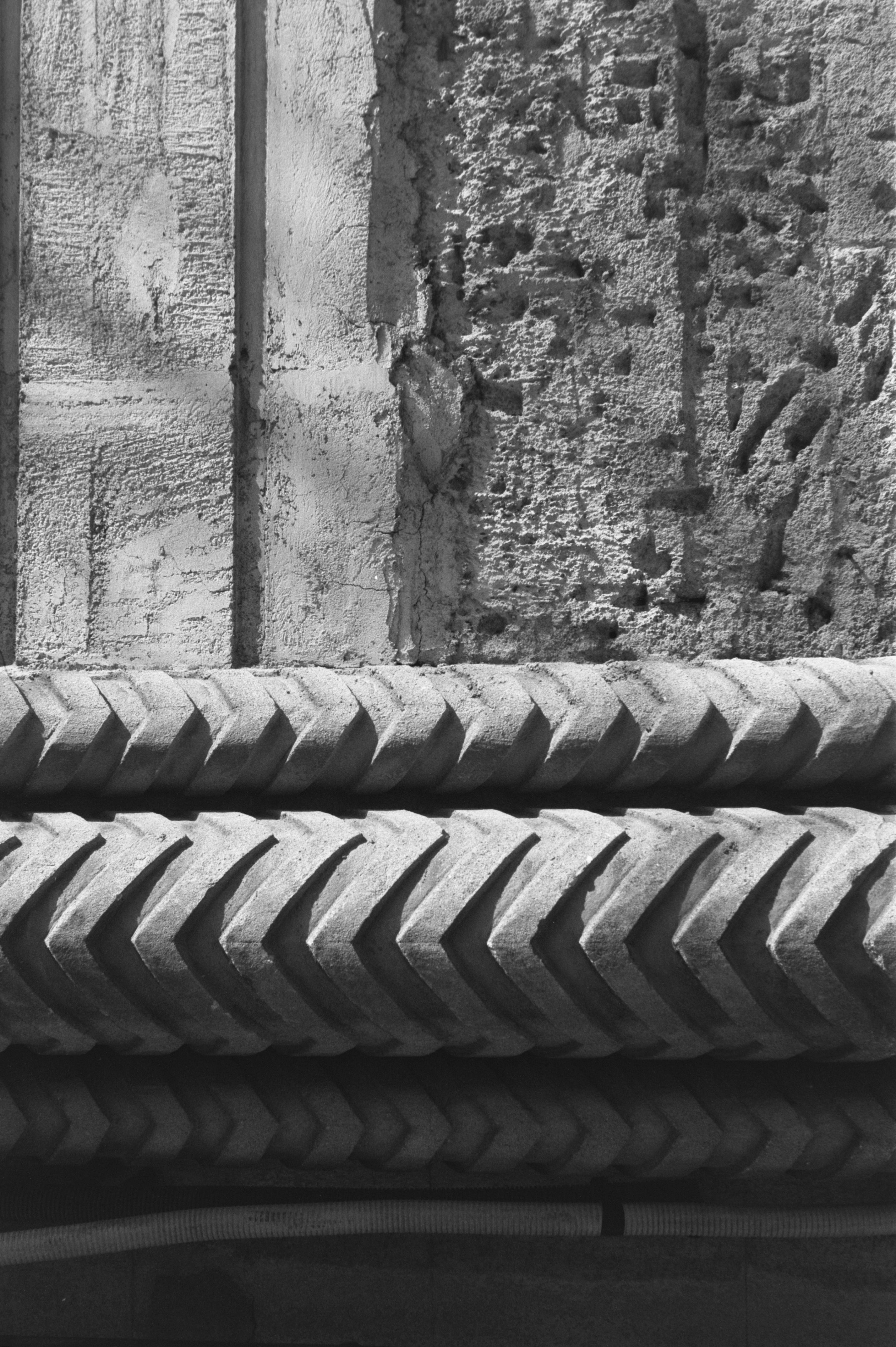 Ridges and Echoes: Concrete Texture in Monochrome Strata