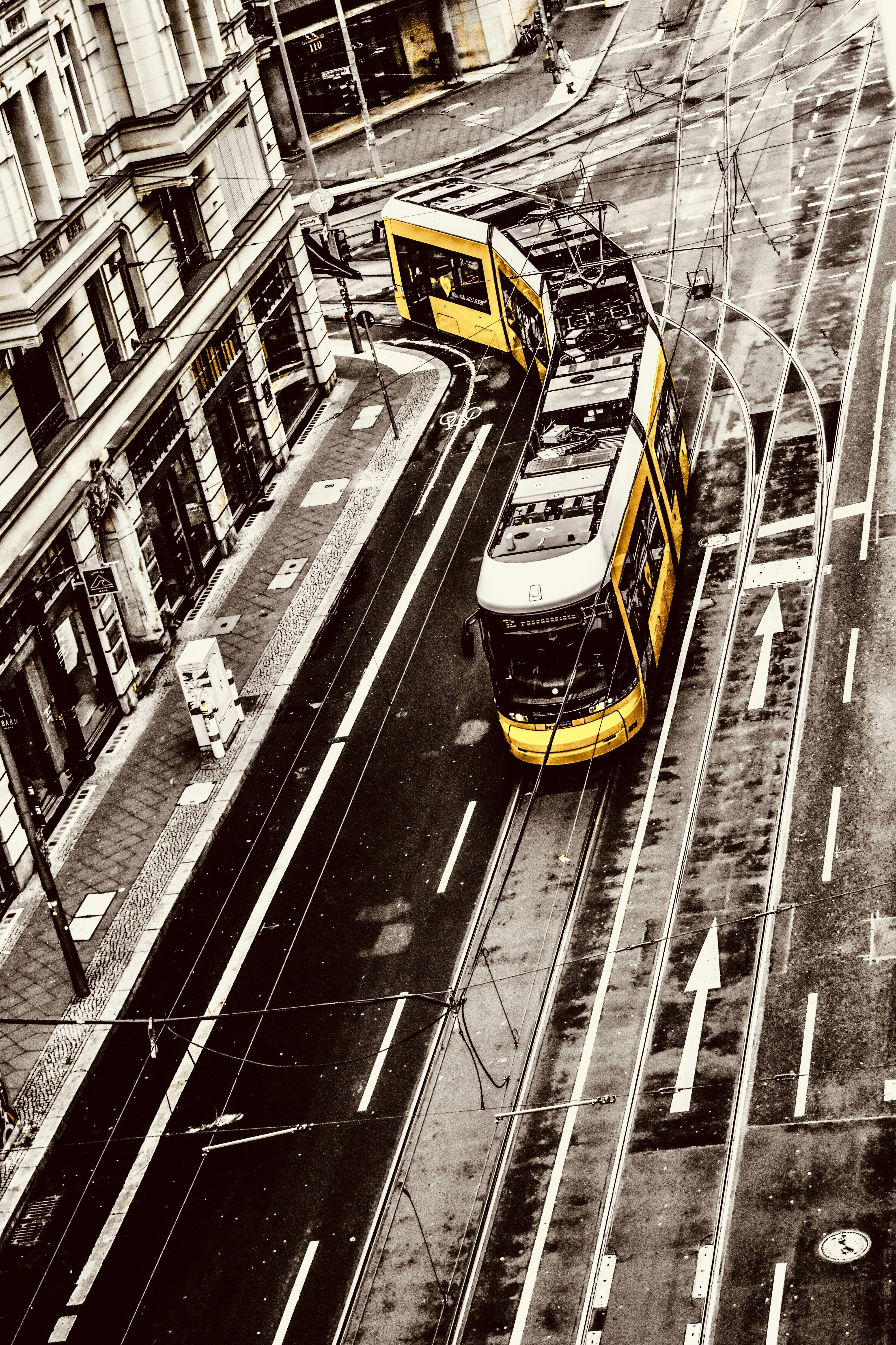 Yellow Tram in a Monochrome City Echo