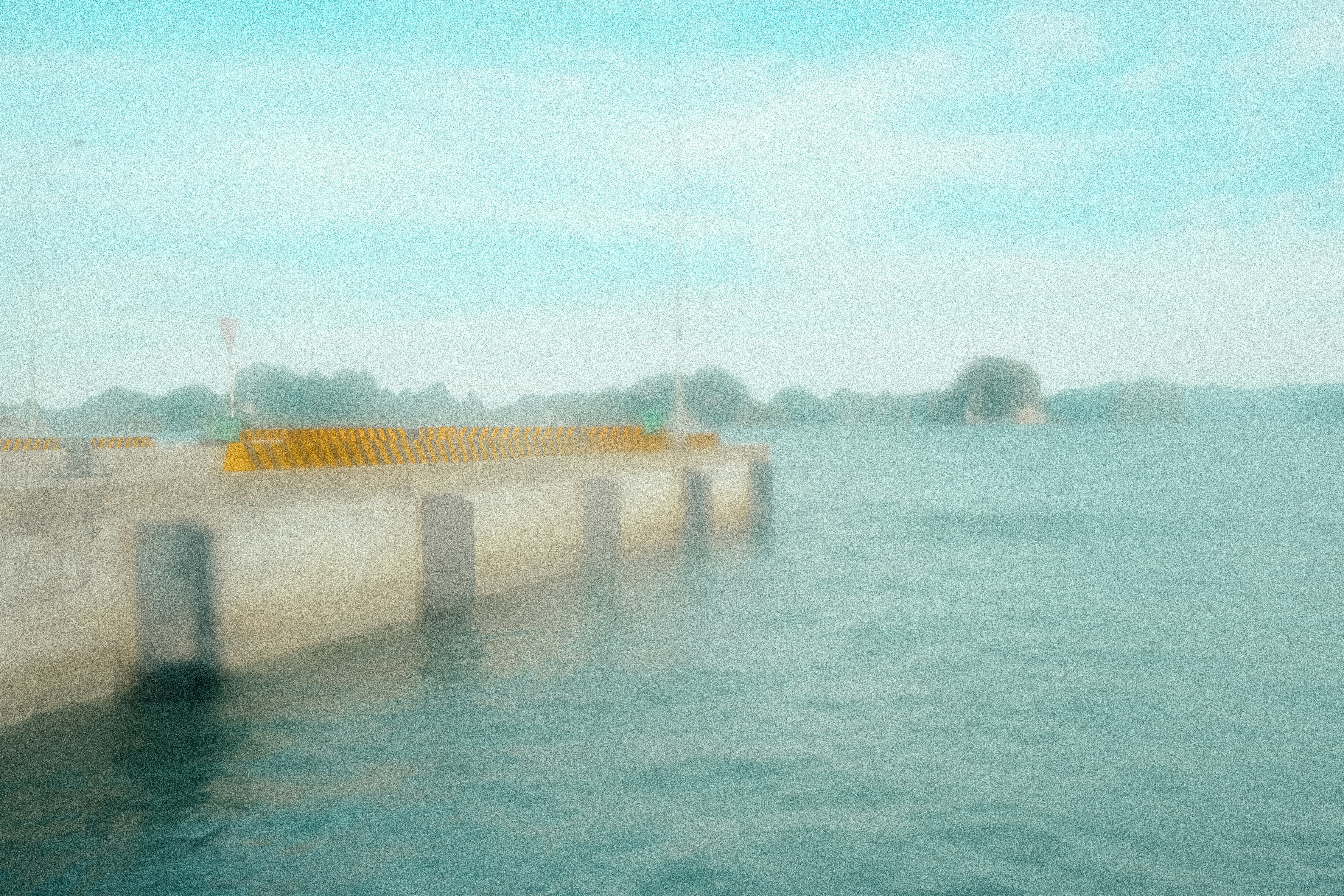 Quiet Breakwater at Distant Horizon