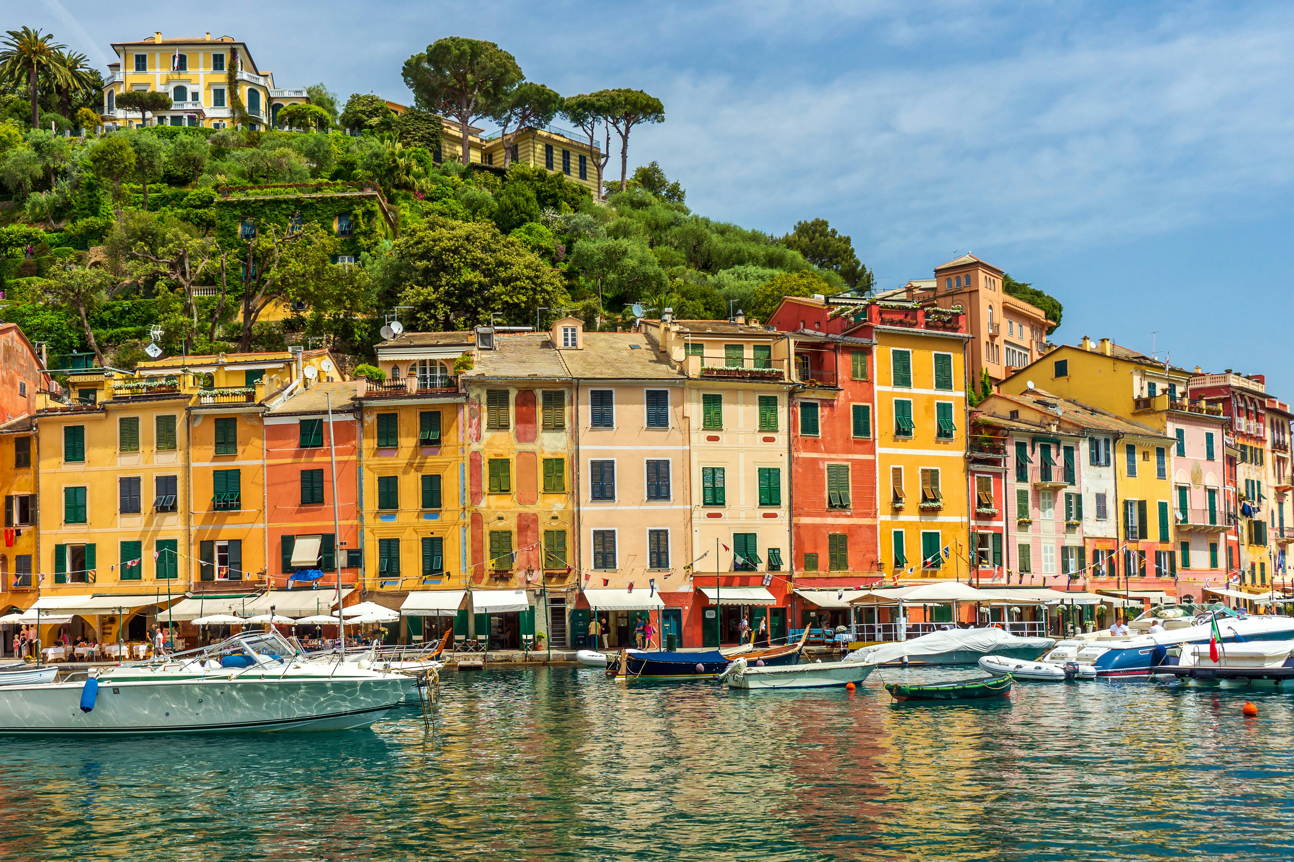 Colorful waterfront village fade into clear blue sky