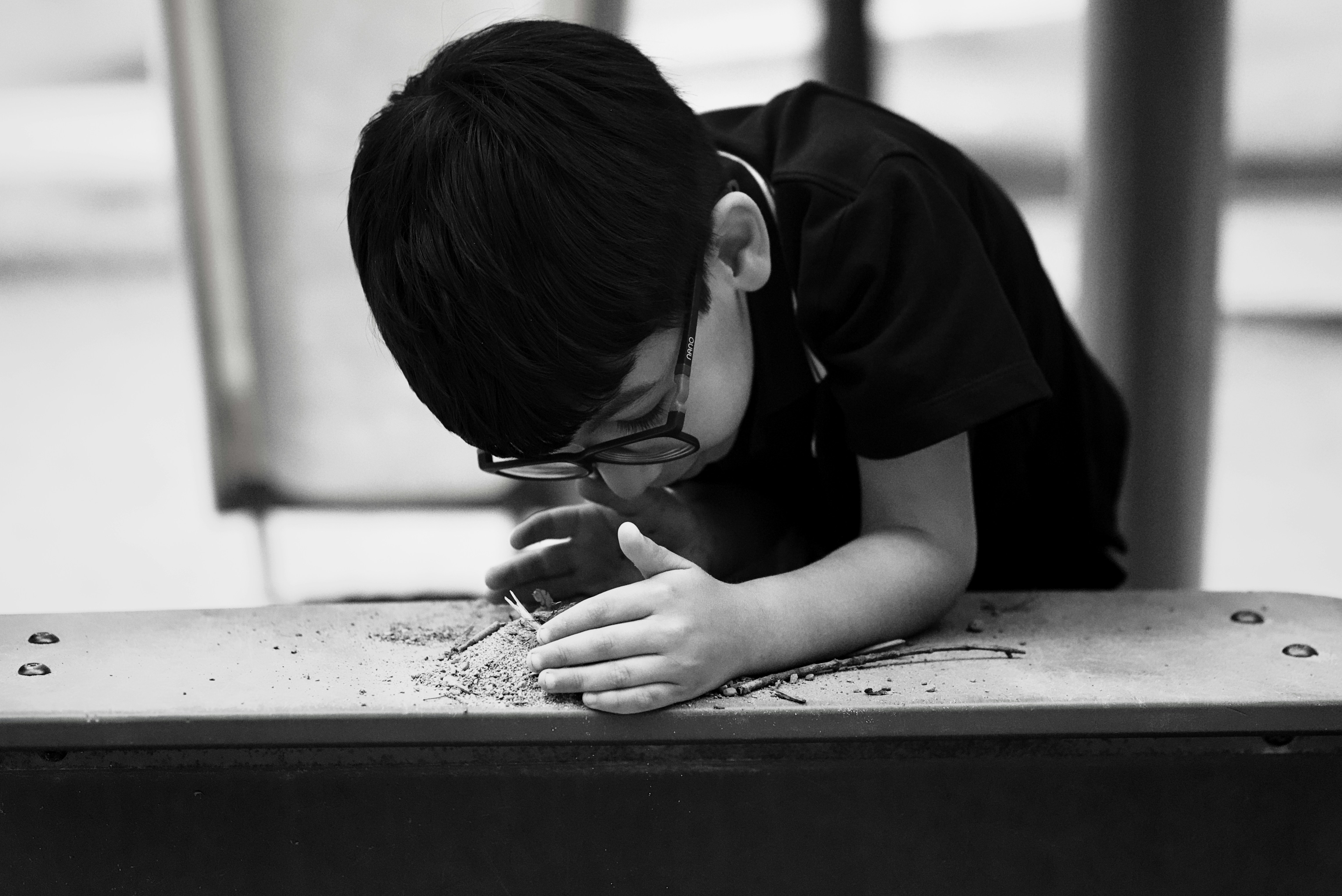 Focused Hands: A Quiet Moment Tracing a Diminutive Sketch