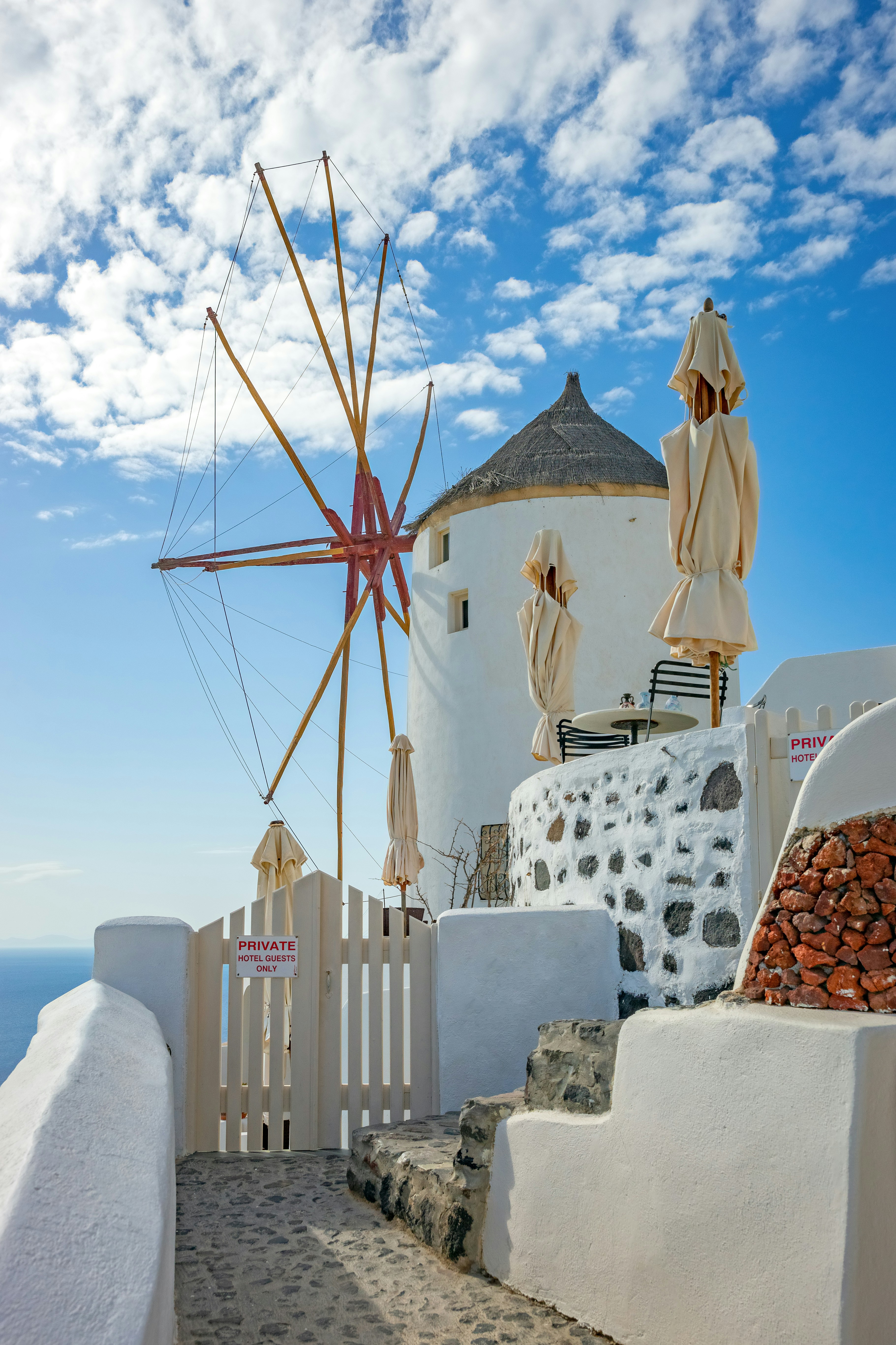 Windmill on a White Caldera: Aegean Quiet at Cliffside Path