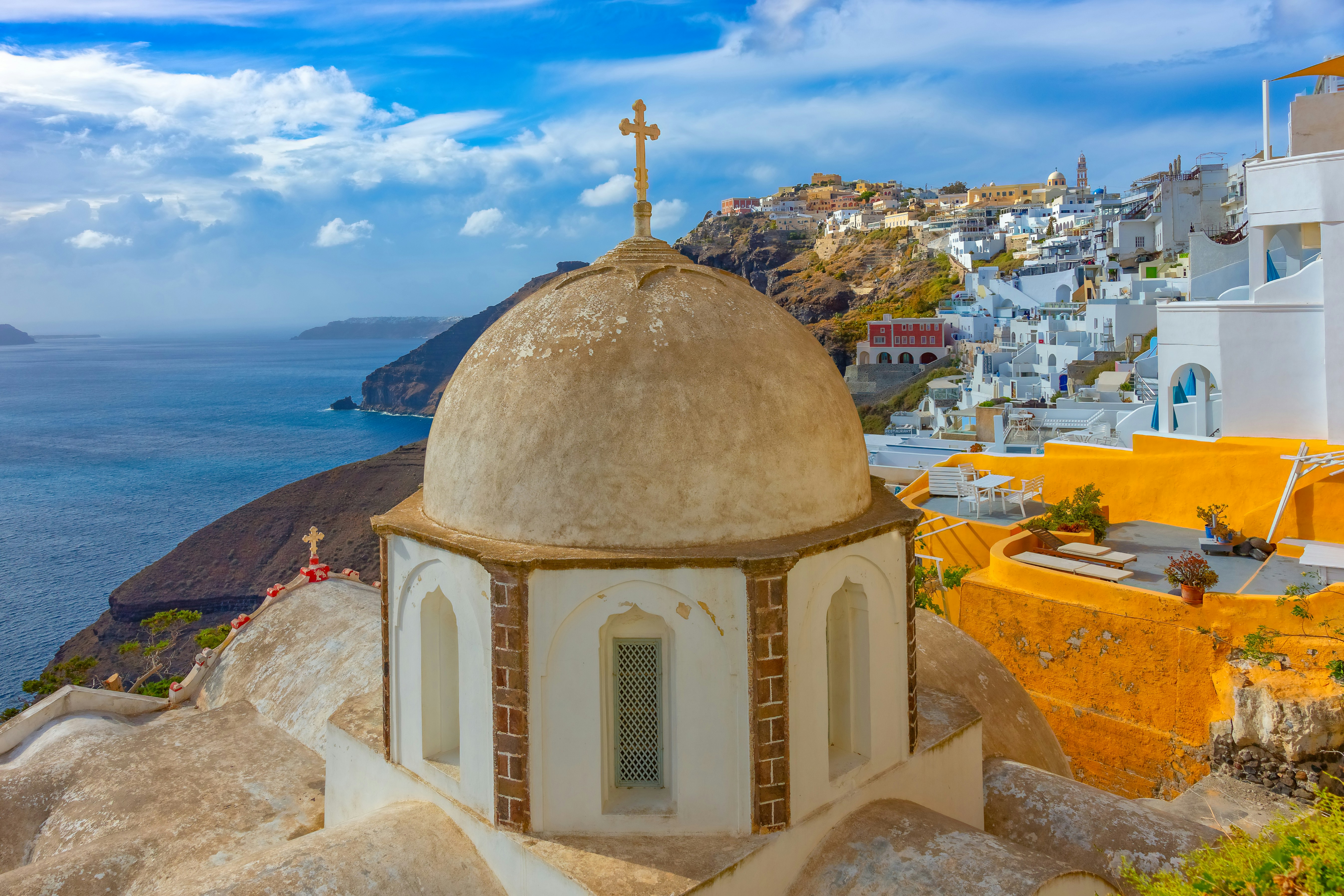 Dome Overlooking the Caldera: Aegean Light on a Cycladic Clifftop