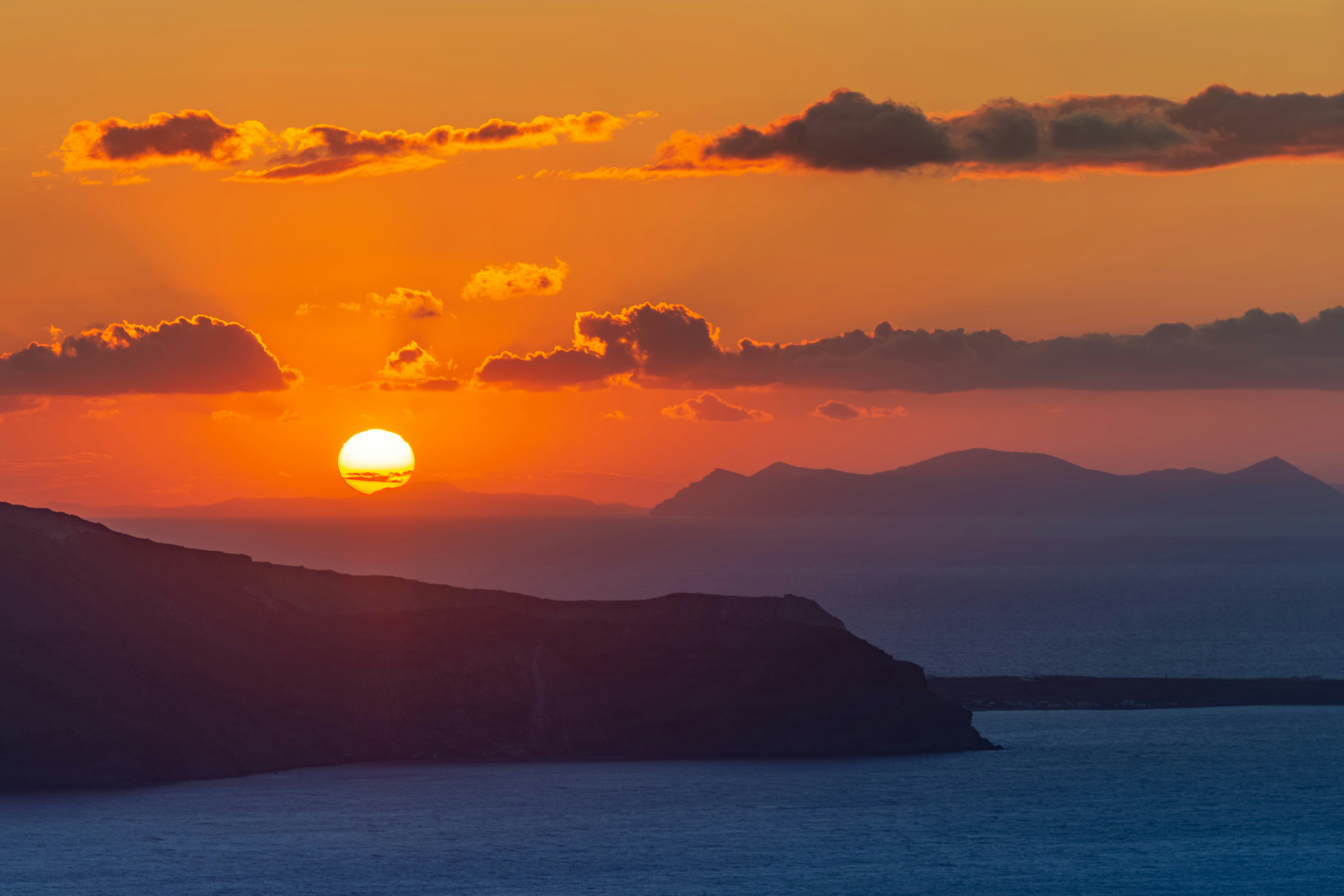 Sunset Tide Behind the Silhouette: A Coastal Horizon