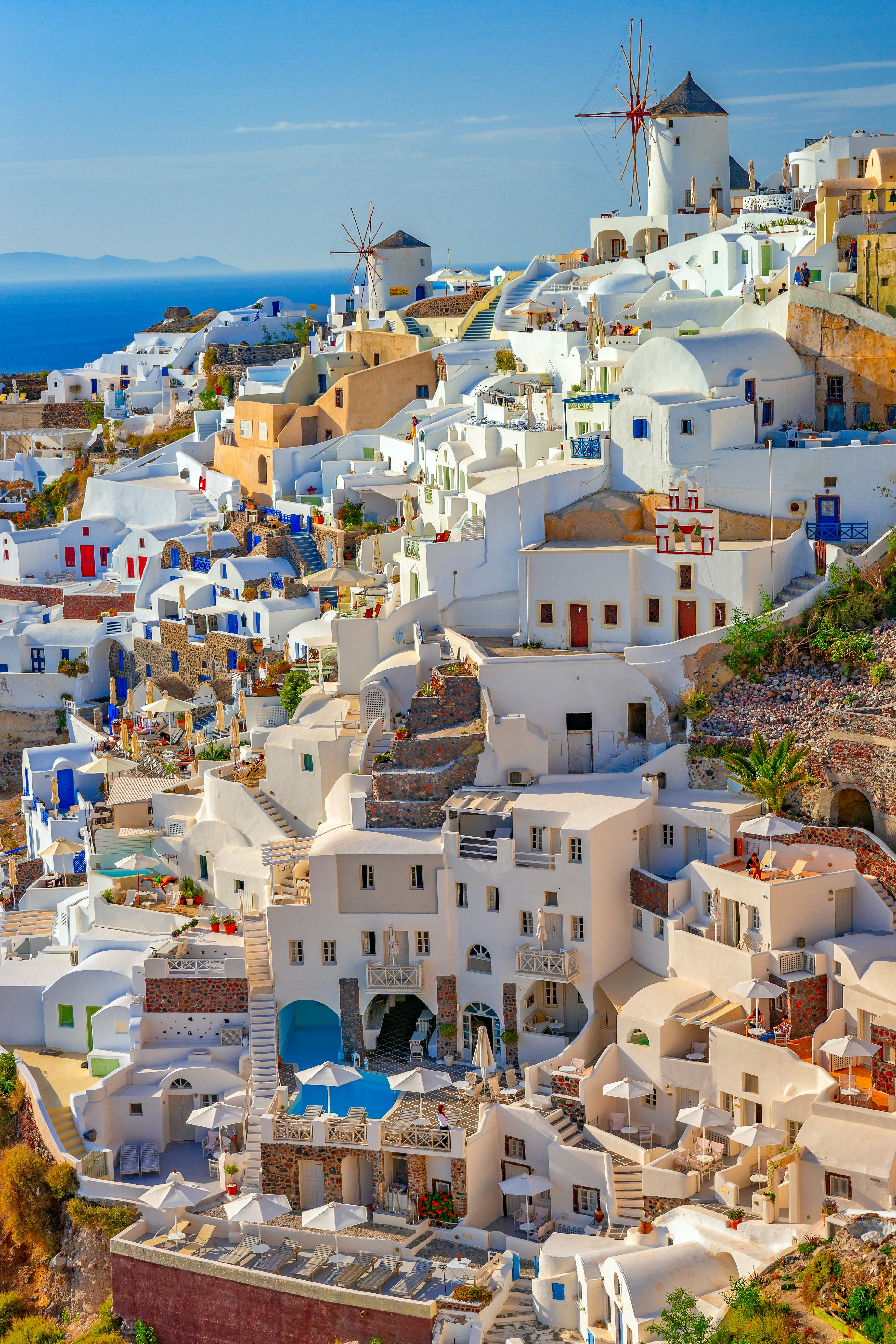 Aegean Staircase: Whitewashed Village Cliffs Above the Sea