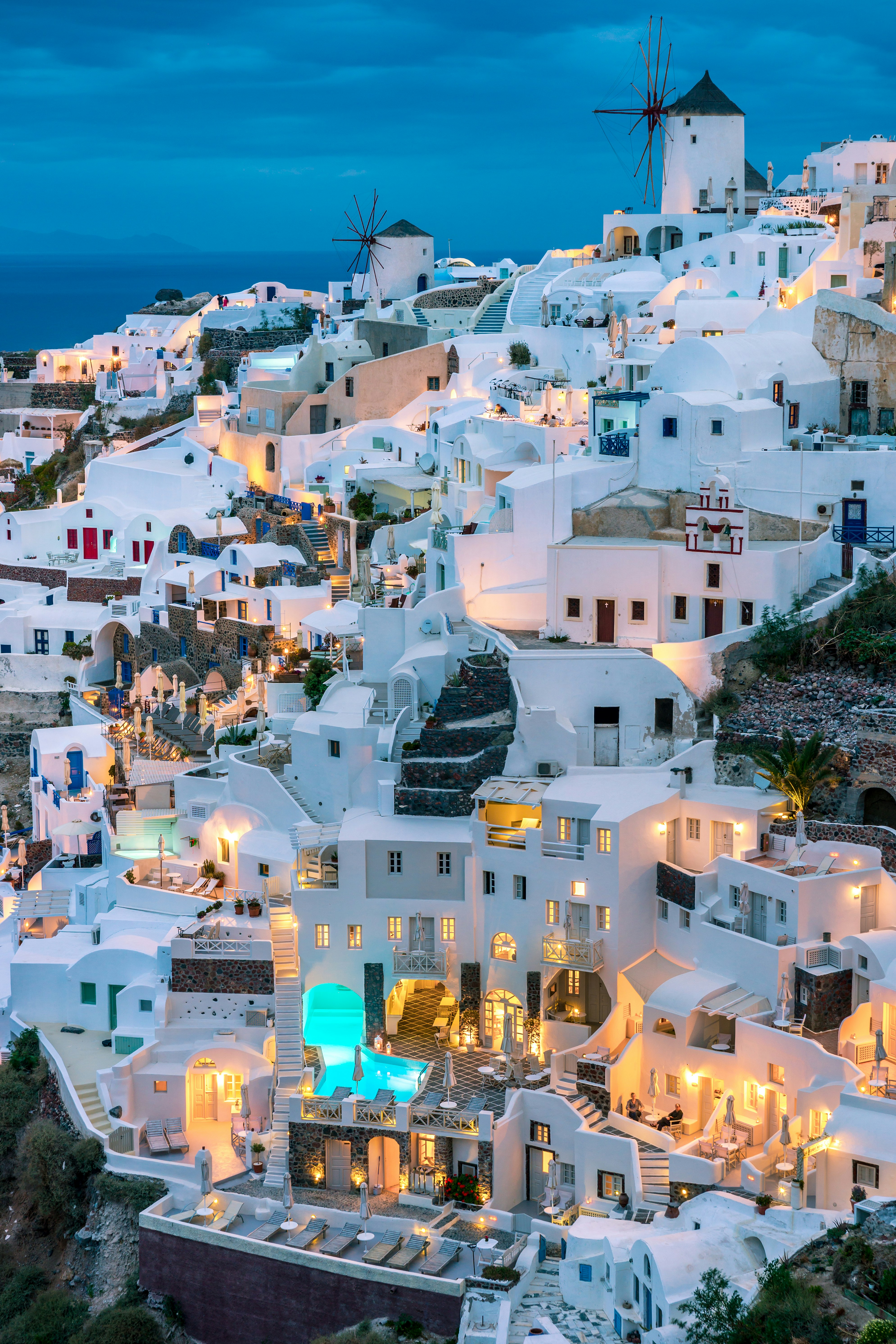 Whitewashed Village of Santorini: Aegean Twilight Over Cascading Steps