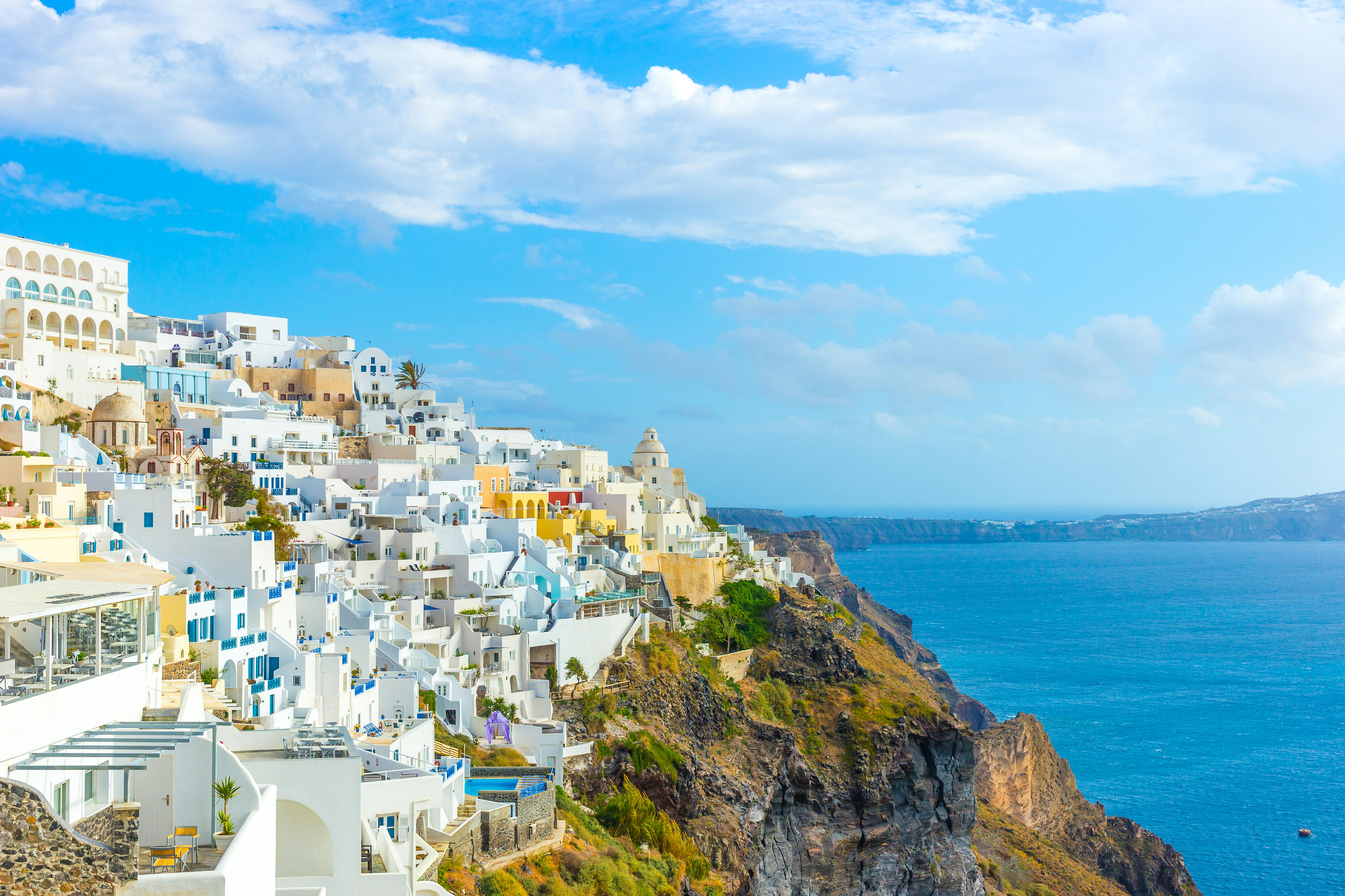 Whitewashed Cliffside Village Overlooking Aegean Sea