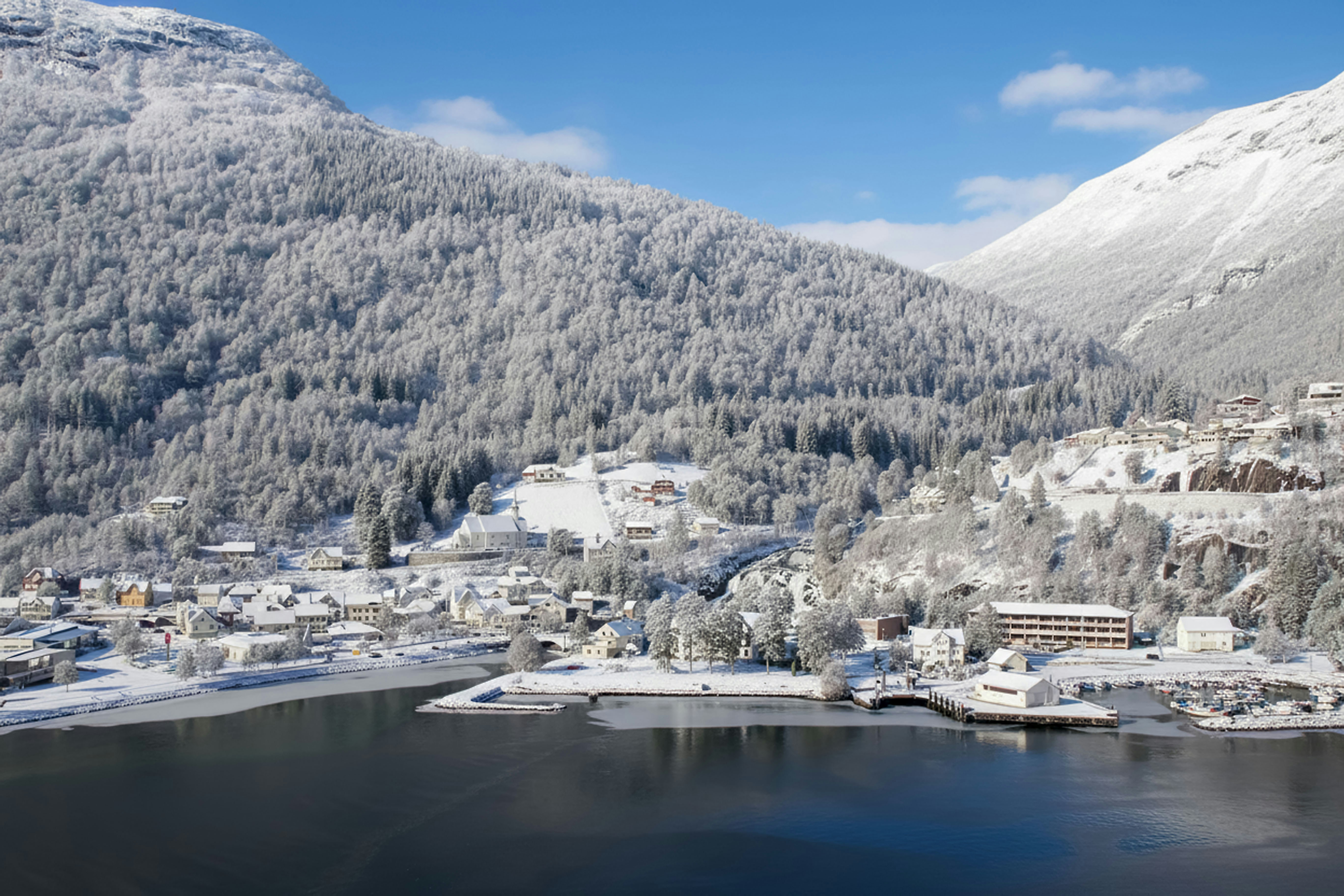 Snowbound Village Nestled Along a Quiet Fjord