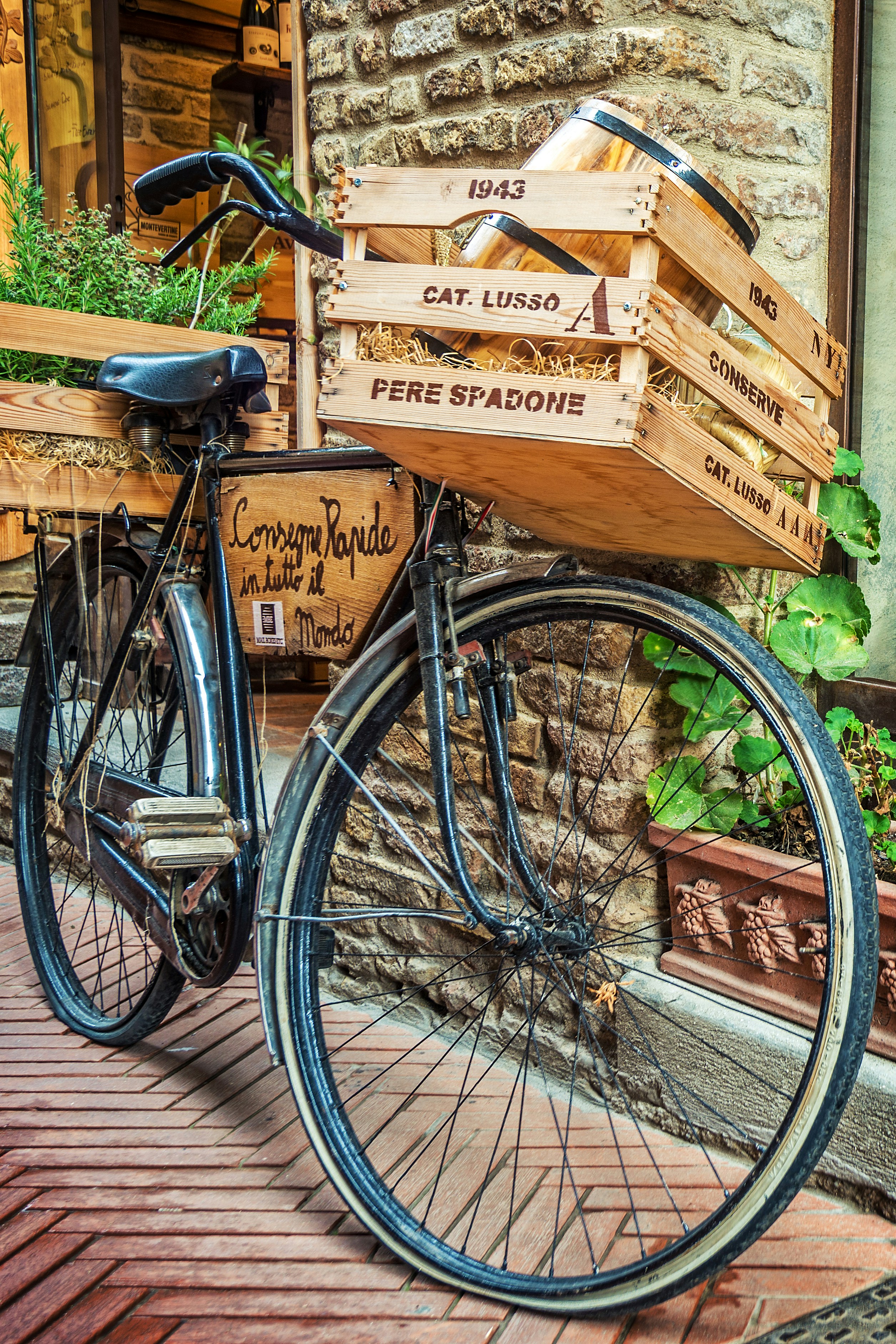Curbside Wine and Wood: A Bicycle with Crated Harvests