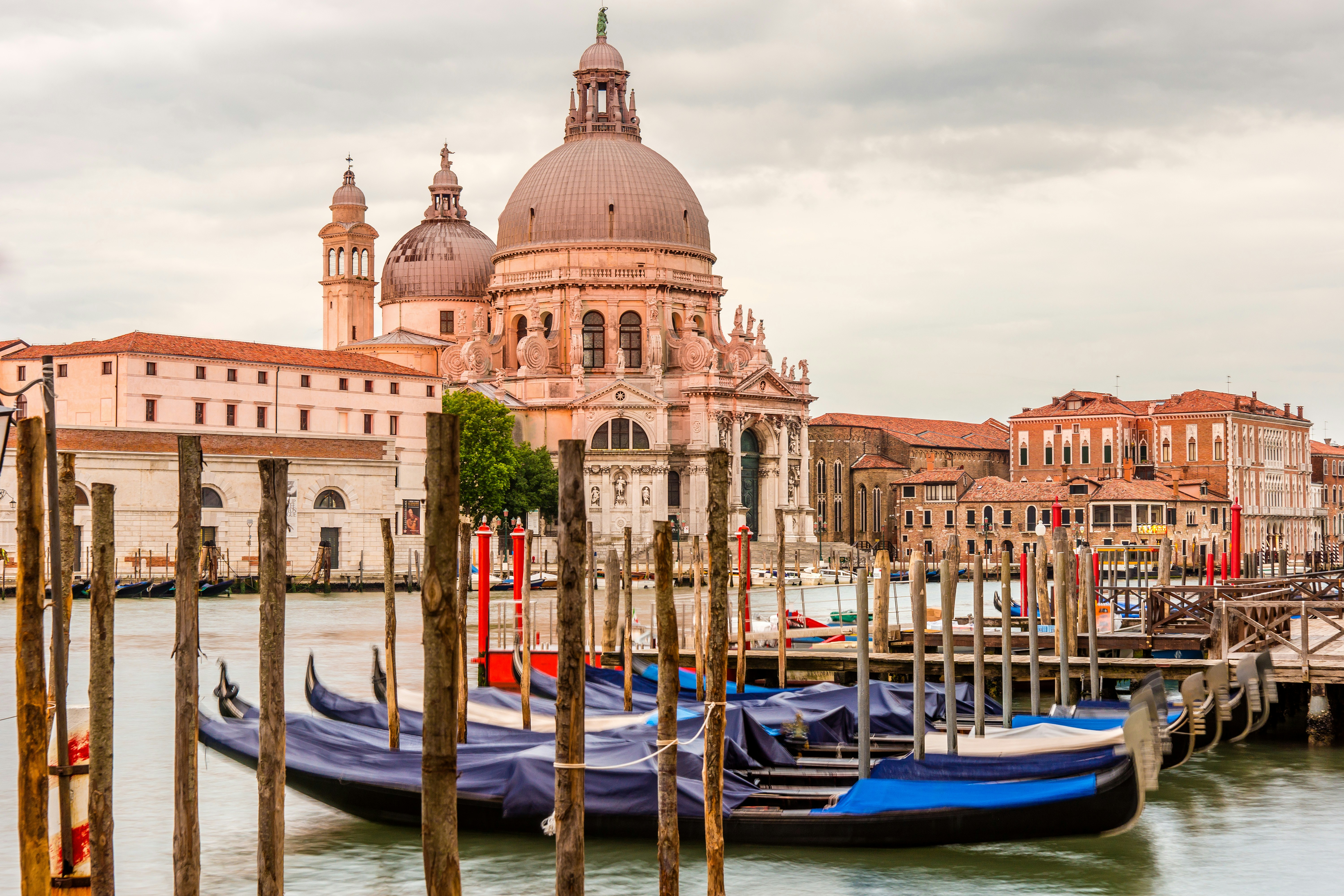 Venetian Dome at Dusk: Boats Rest Along Stately Piers