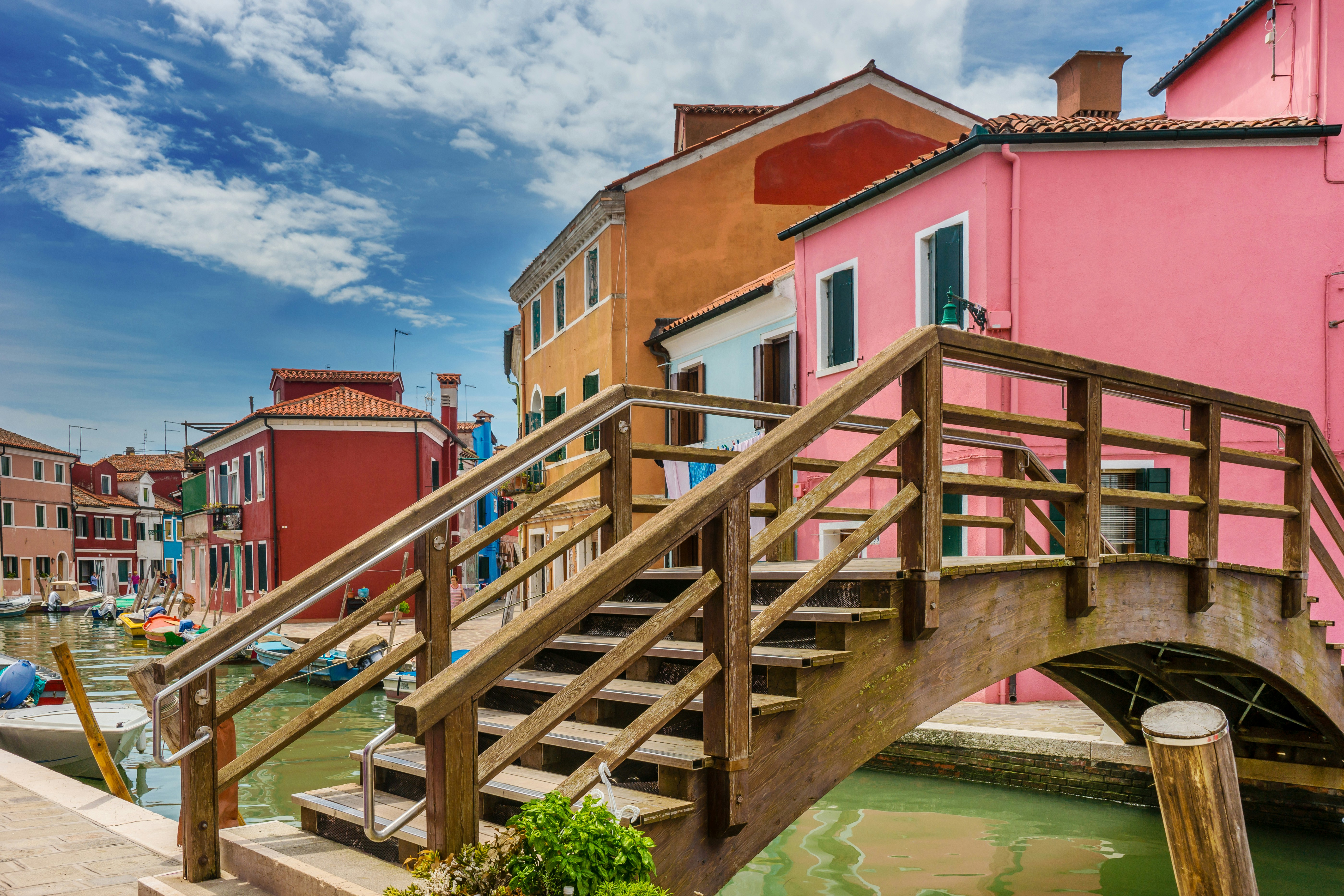 Bridge Over Colorful Canal Life