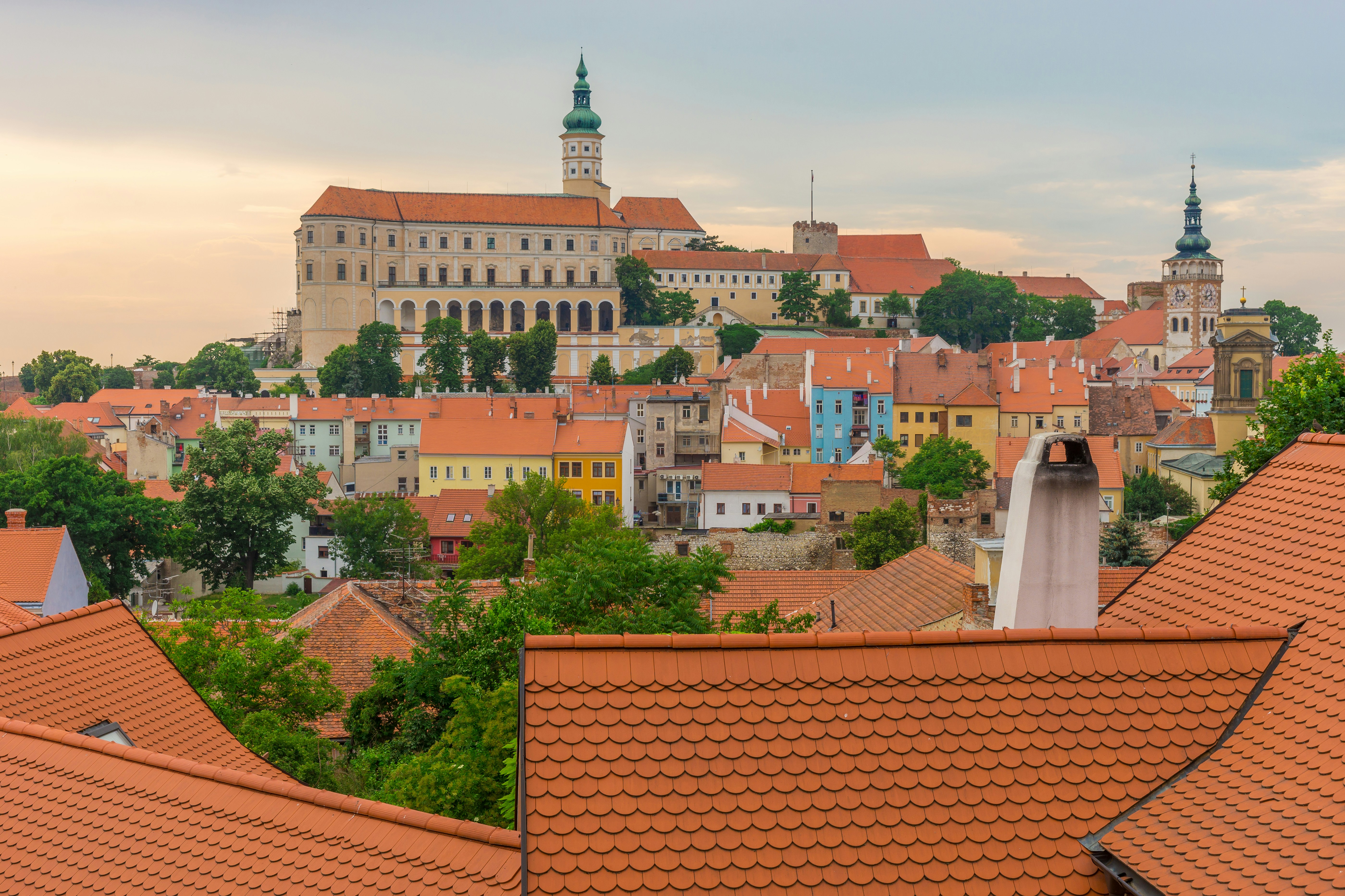 Riverside Castle Overlook: A Colorful European Rooftop Panorama